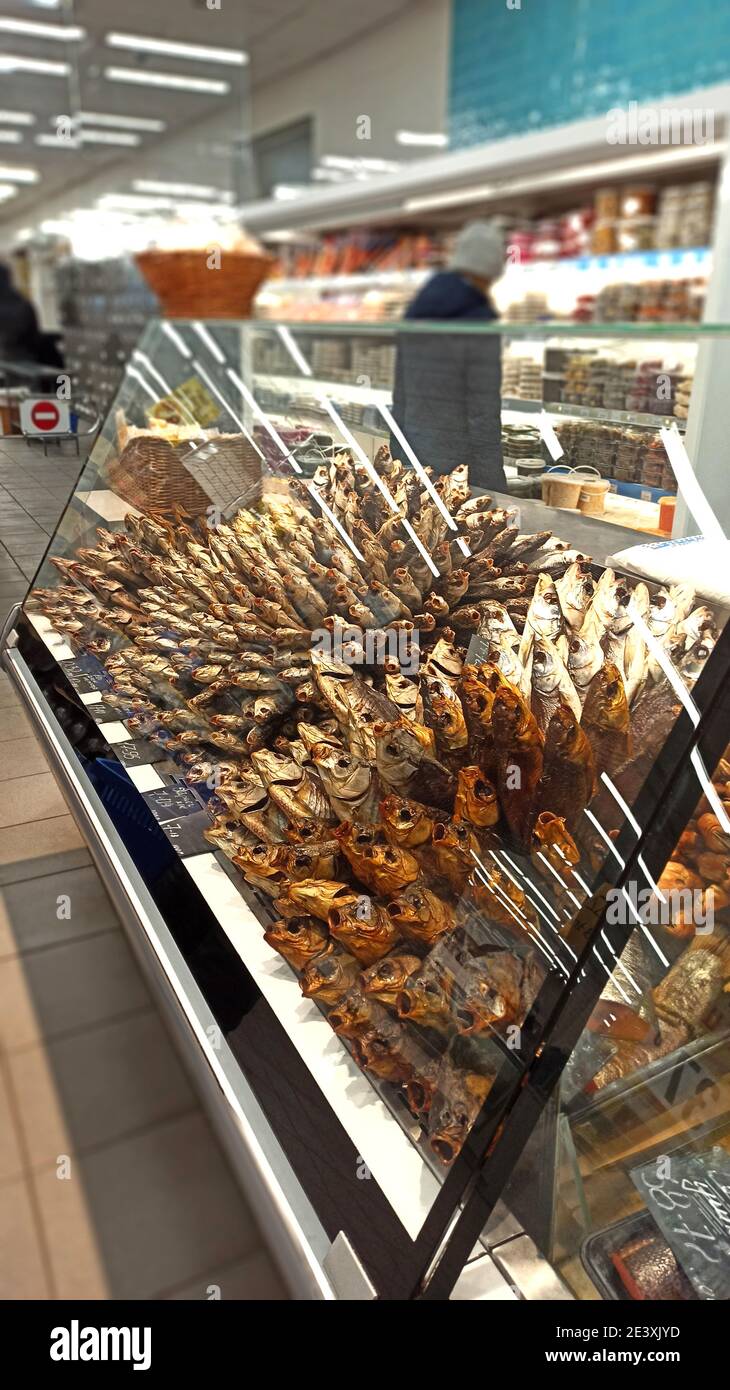 Pile of dry fish in the refrigerator at the supermarket Stock Photo - Alamy
