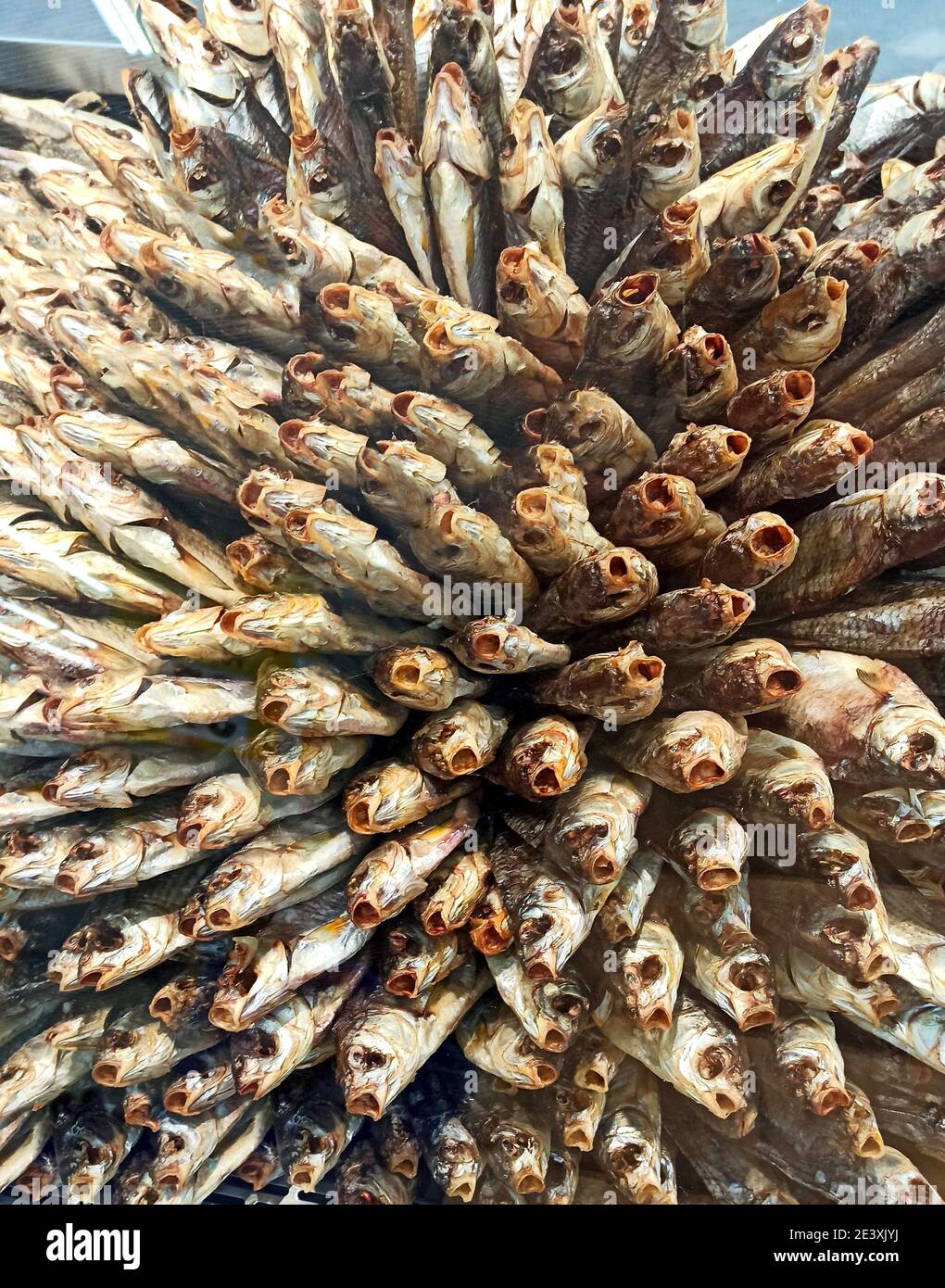 Pile of dry fish at the supermarket. Close up Stock Photo - Alamy