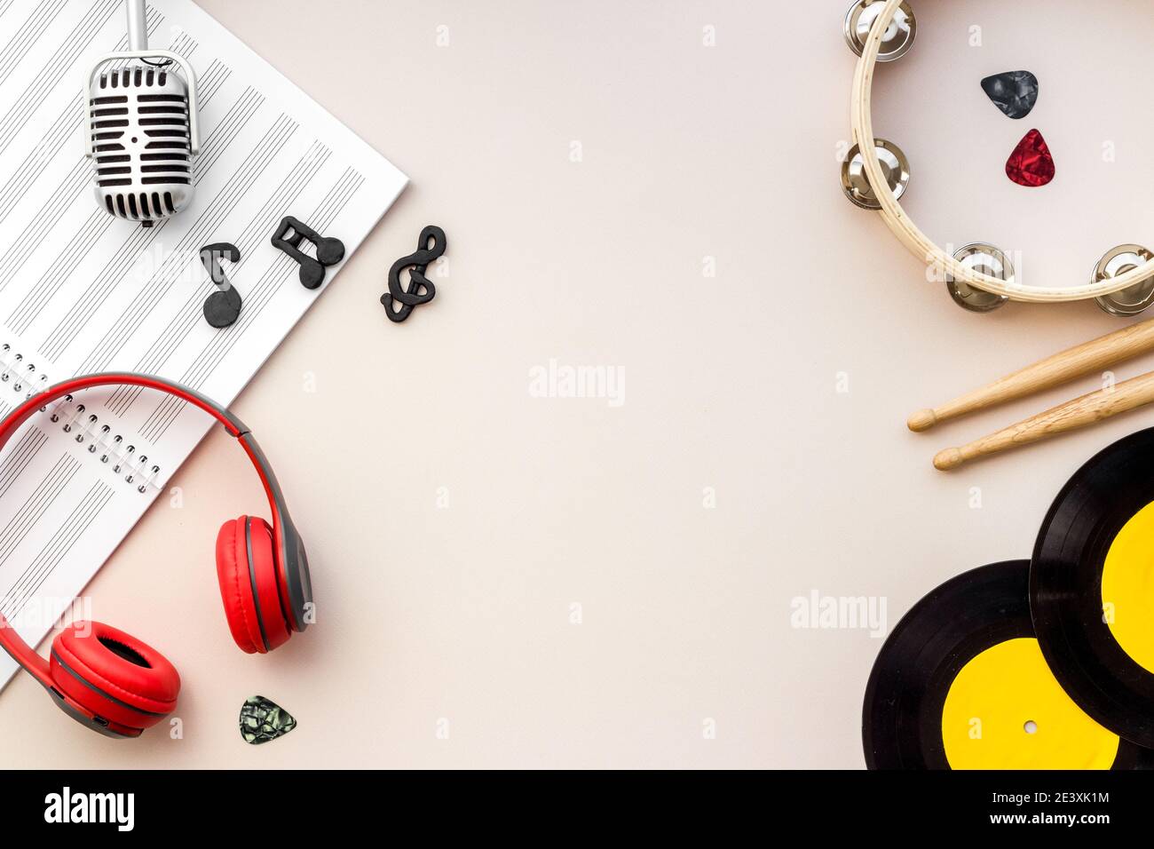 Frame of of music background - instrument with sheet music, top view ...