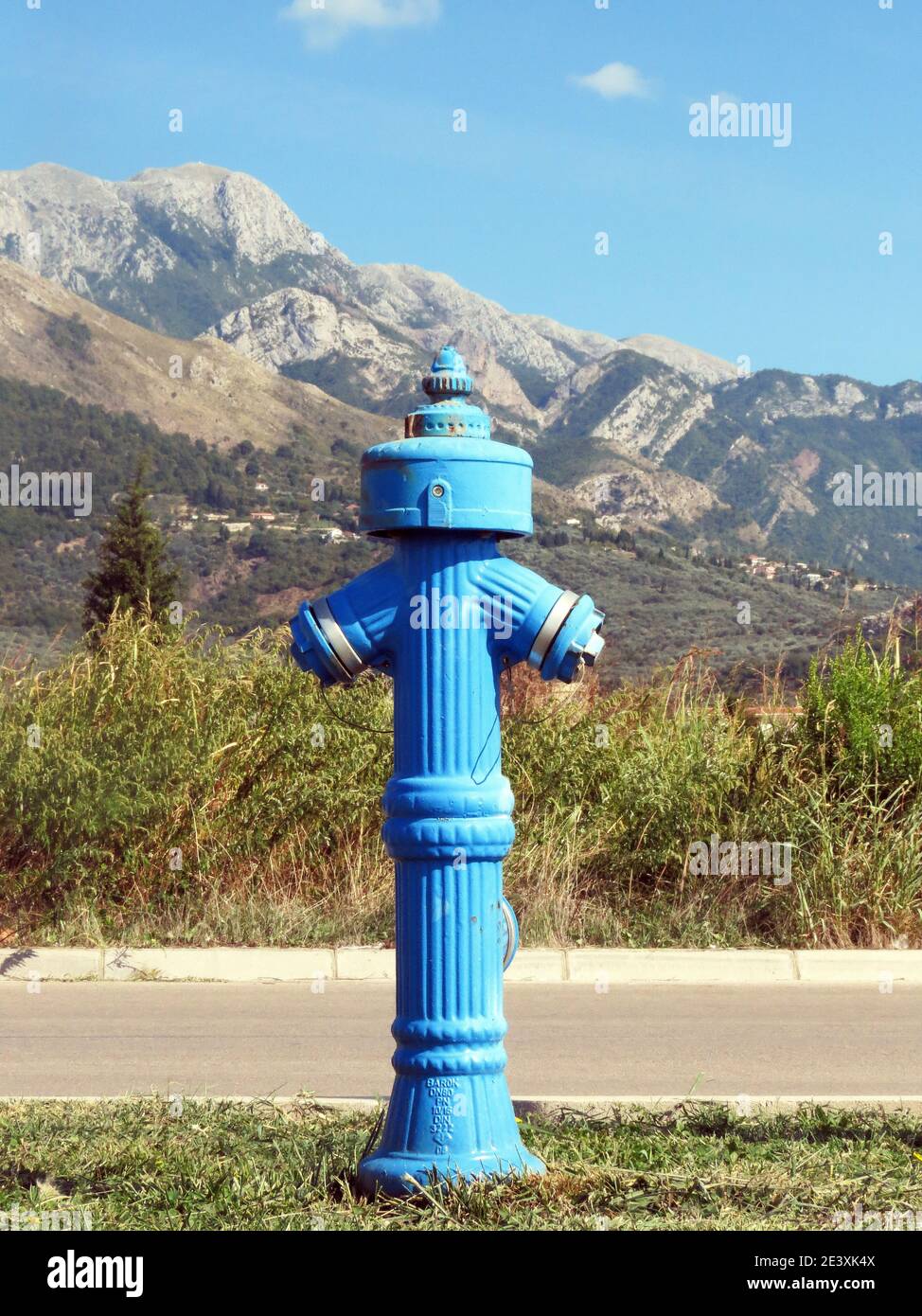 Blue fire hydrant on road in monte negro montain Photo: BoArrhed Stock ...