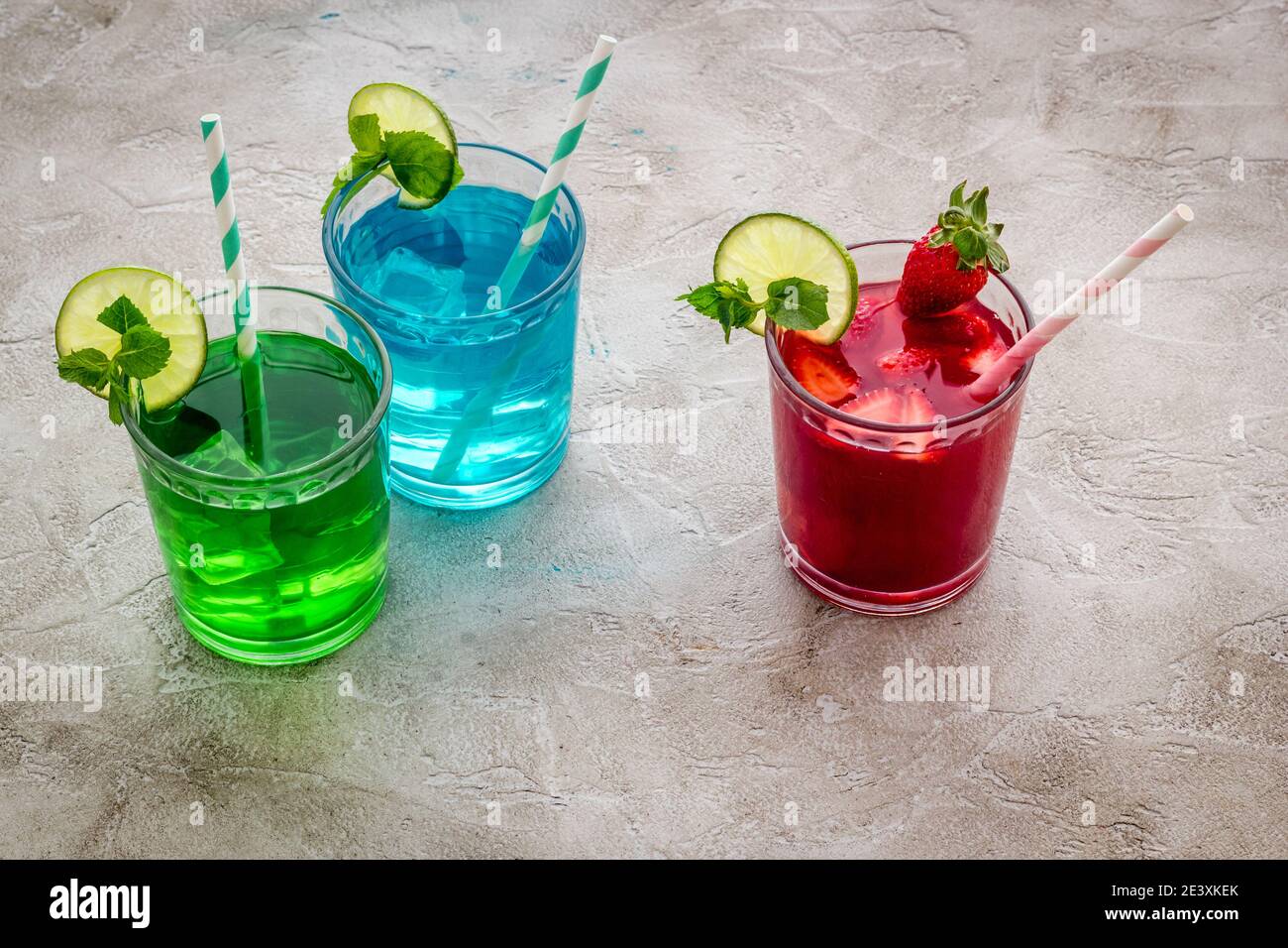 Set of different drinks cocktails with ice - red blue and green Stock ...