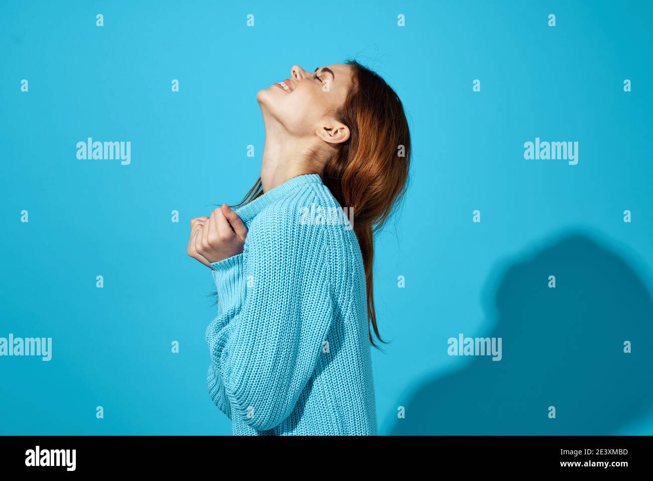 beautiful woman in blue sweater emotions charm attractive look blue ...
