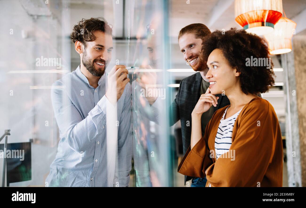 Software engineers working on project and programming in company Stock ...