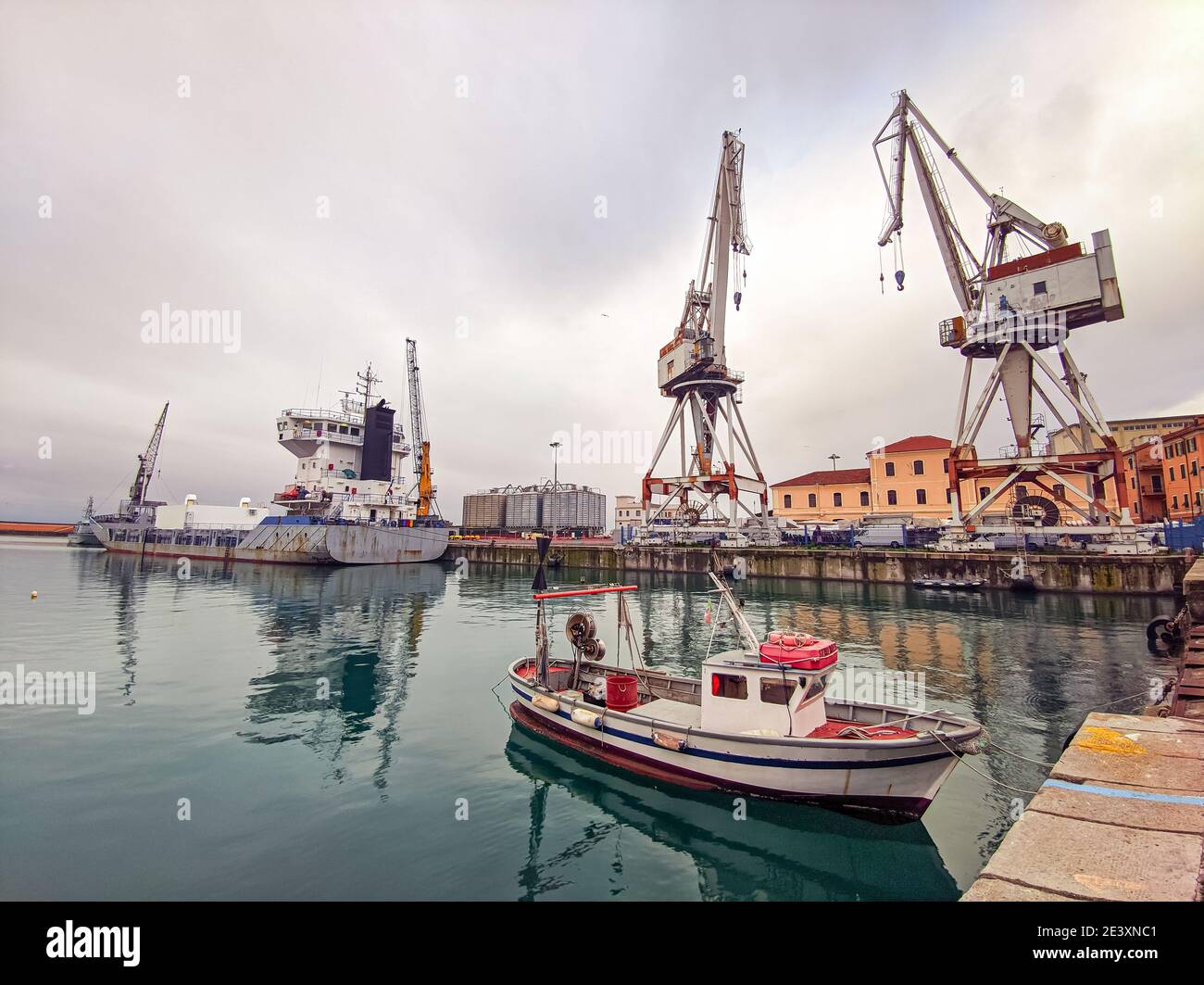 Italy, commercial port of imperia with fishing boats and ancient port ...