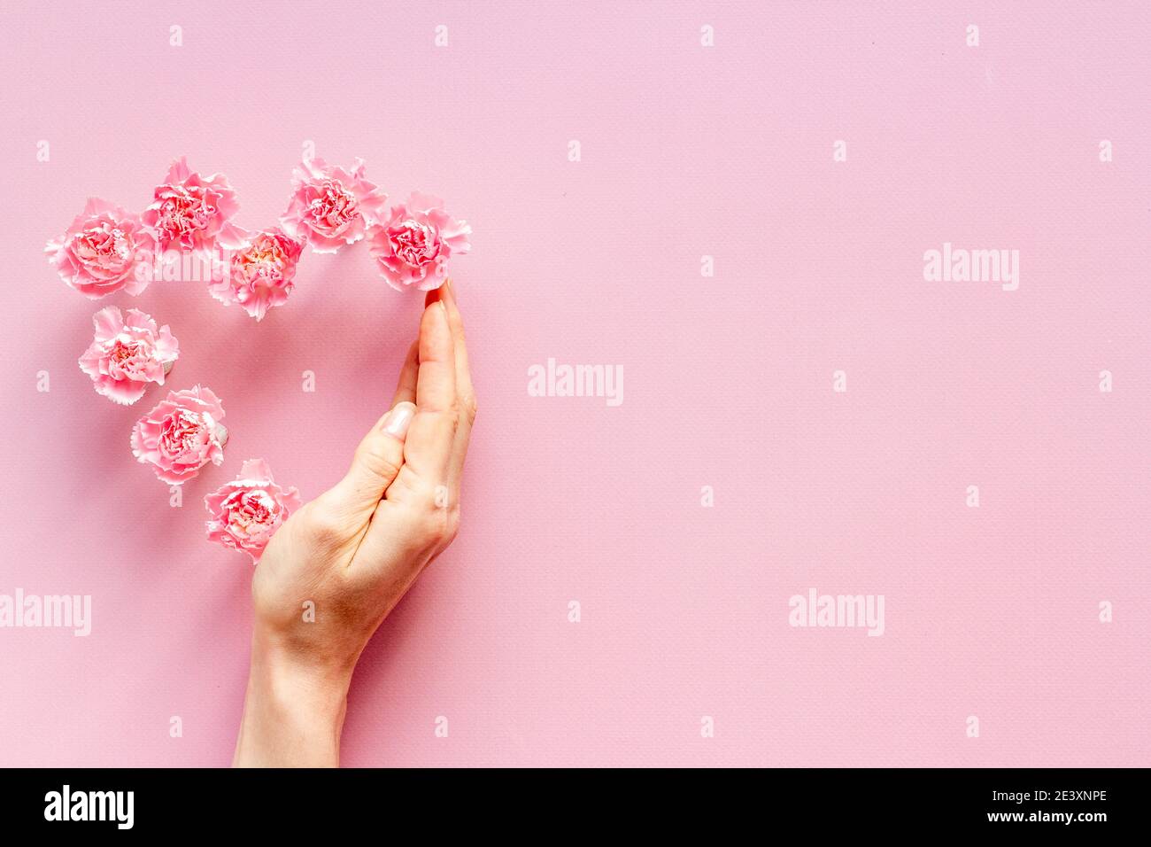 Heart shape of flowers with hands. Valentines Day, wedding or birthday ...