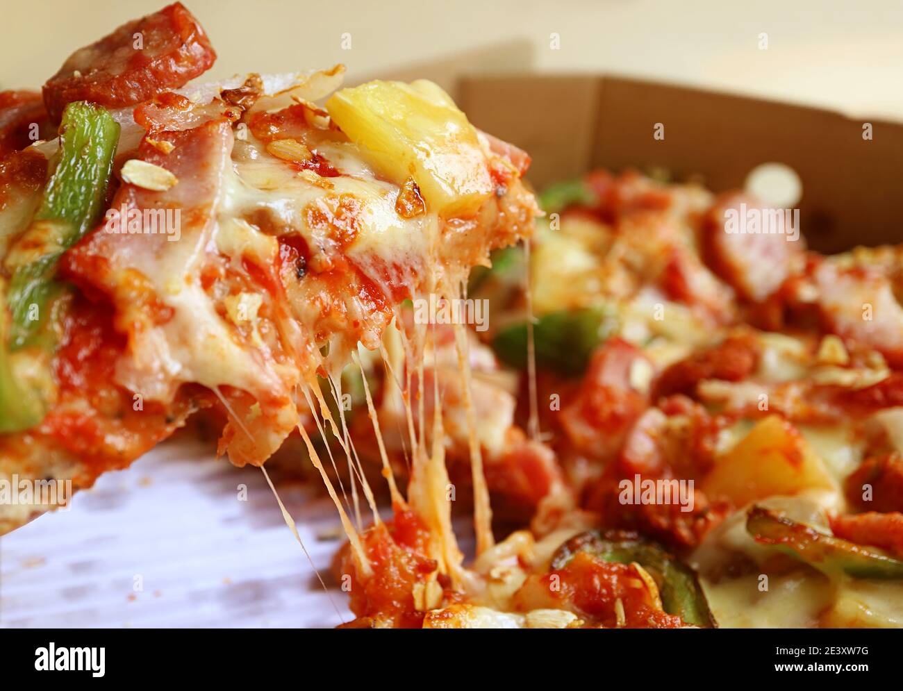 Closeup a Slice of Mouthwatering Pizza with Stretching Cheese Being ...