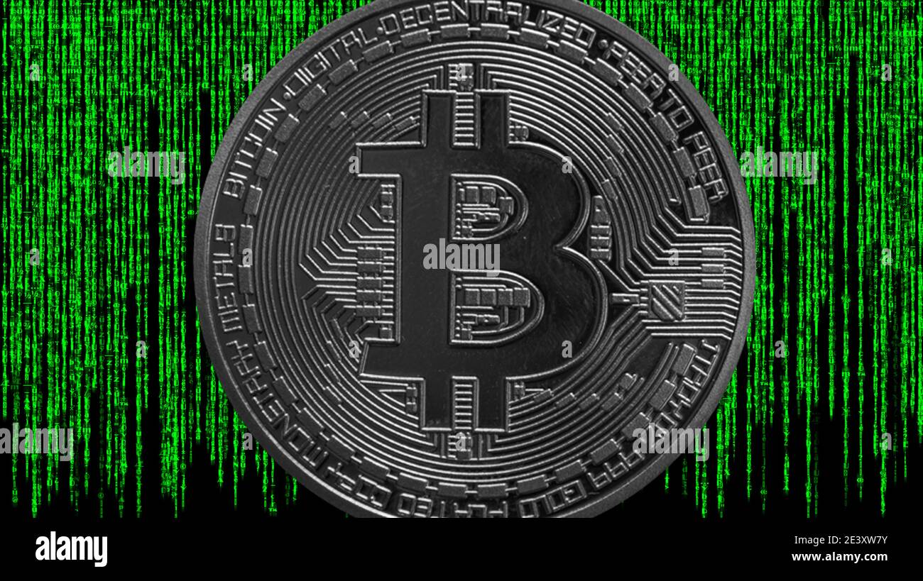 green matrix background with a large bitcoin view in the middle Stock ...