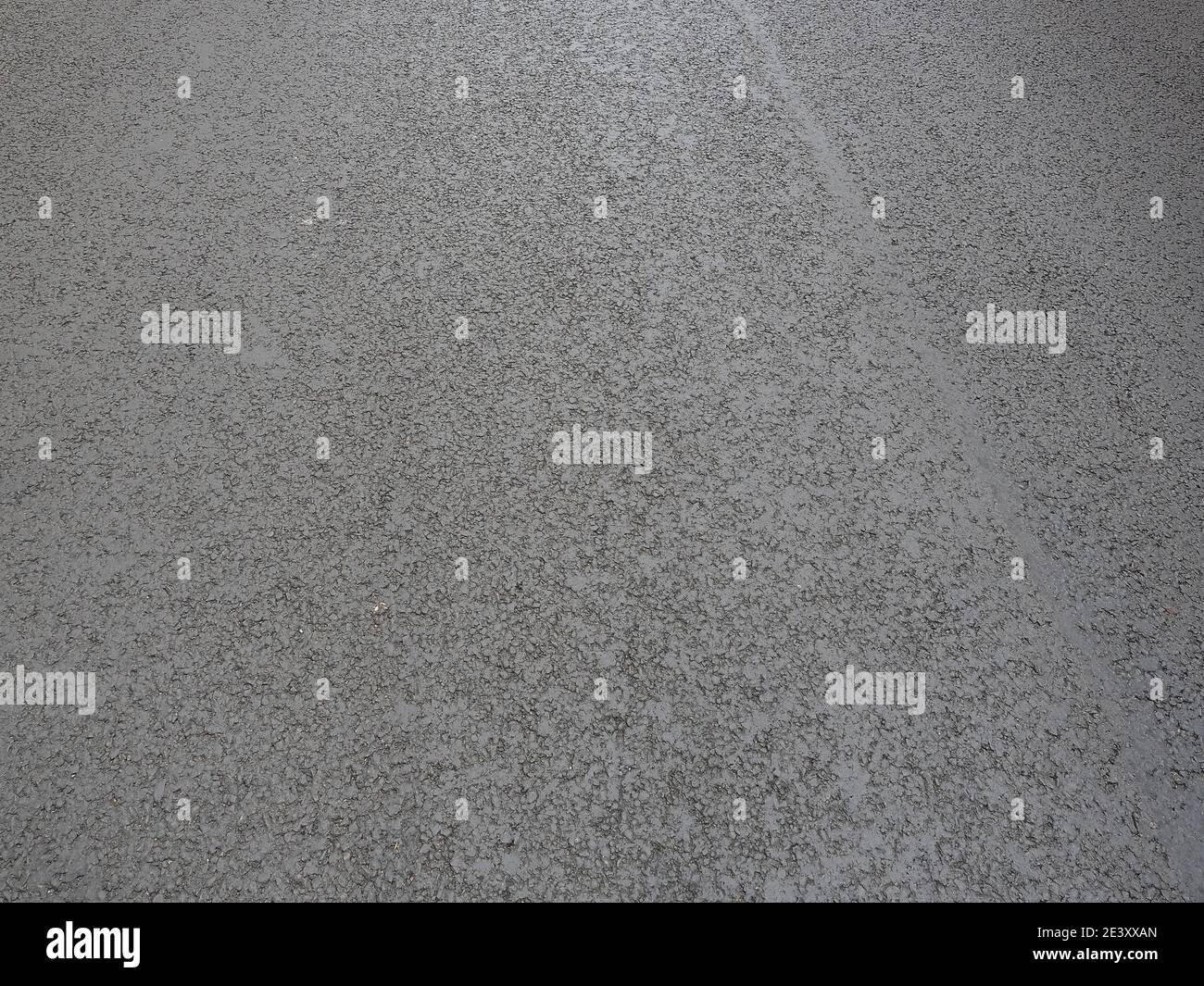 Dark gray new asphalt pavement. Full screen photo Stock Photo - Alamy