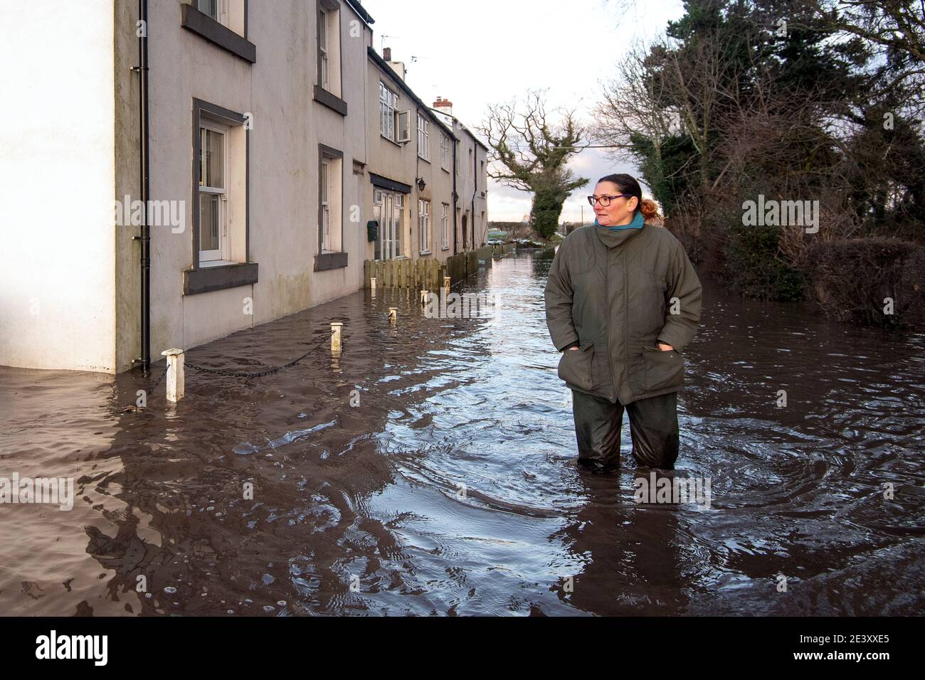 Gabrielle Burns-Smith outside her flooded home on the outskirts of Lymm ...