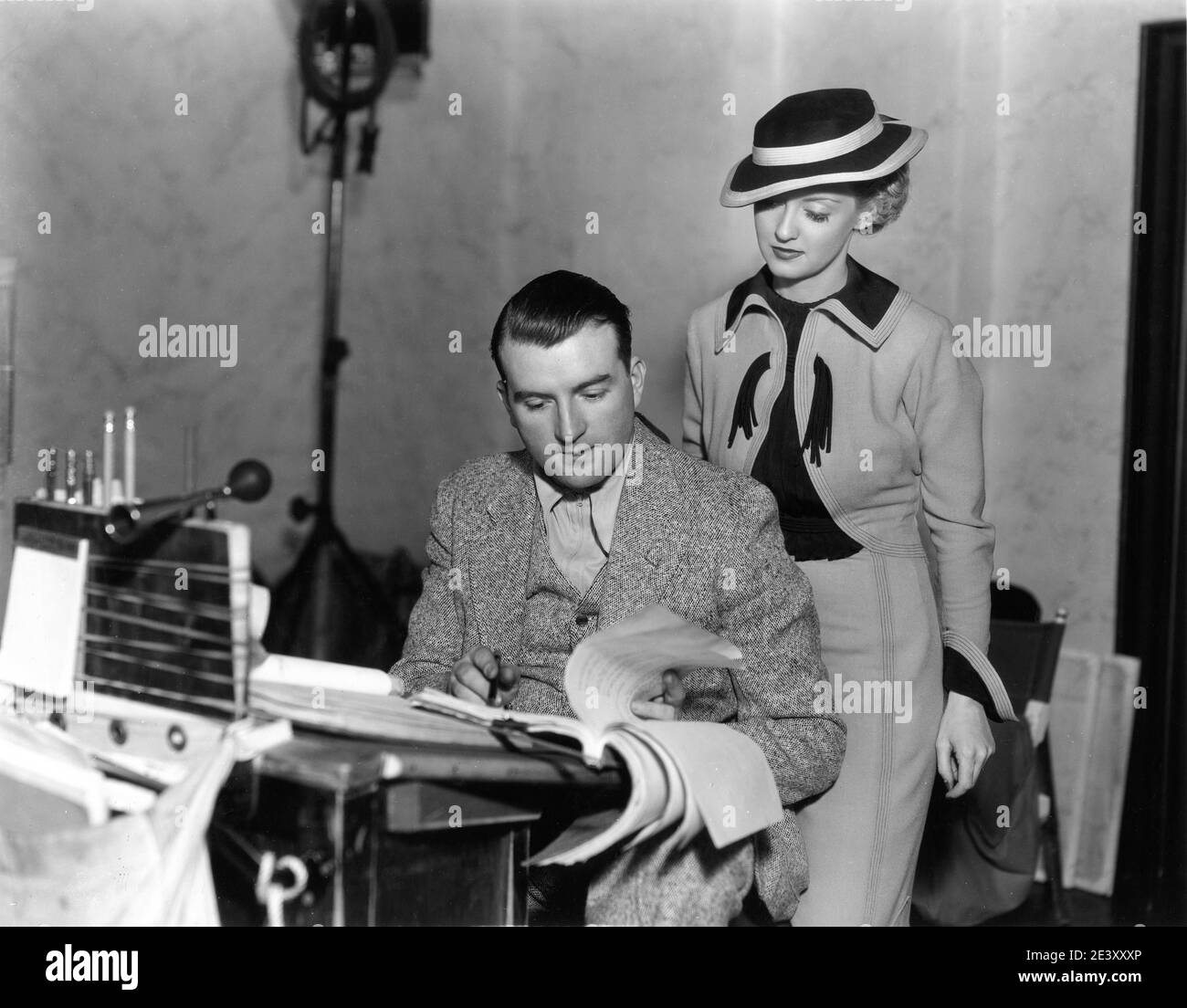 BETTE DAVIS and Dialogue Director FRANK MacDONALD on set candid going ...