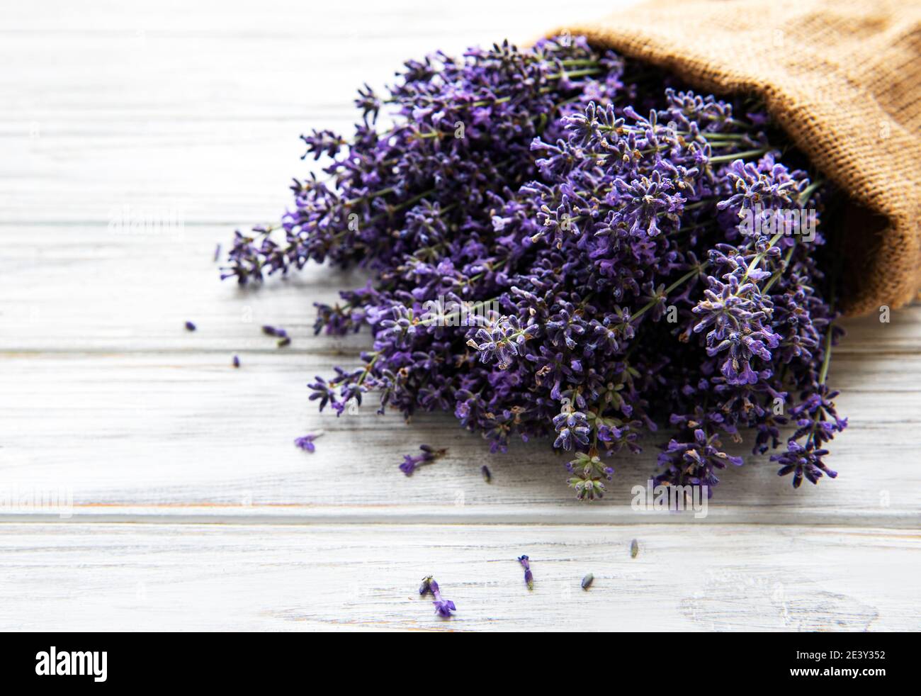 Fresh flowers of lavender bouquet, top view on white wooden background ...
