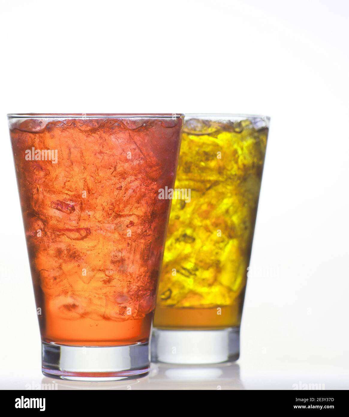 Two iced cool drinks on a white background Stock Photo - Alamy
