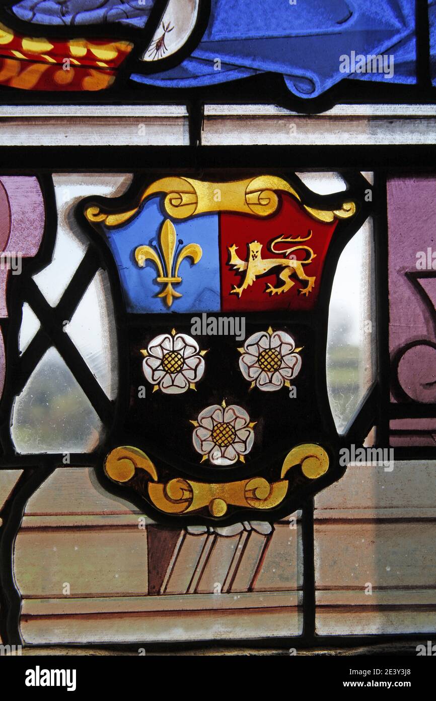 Detail of a stained glass window by Harry Stammers depicting the coat ...