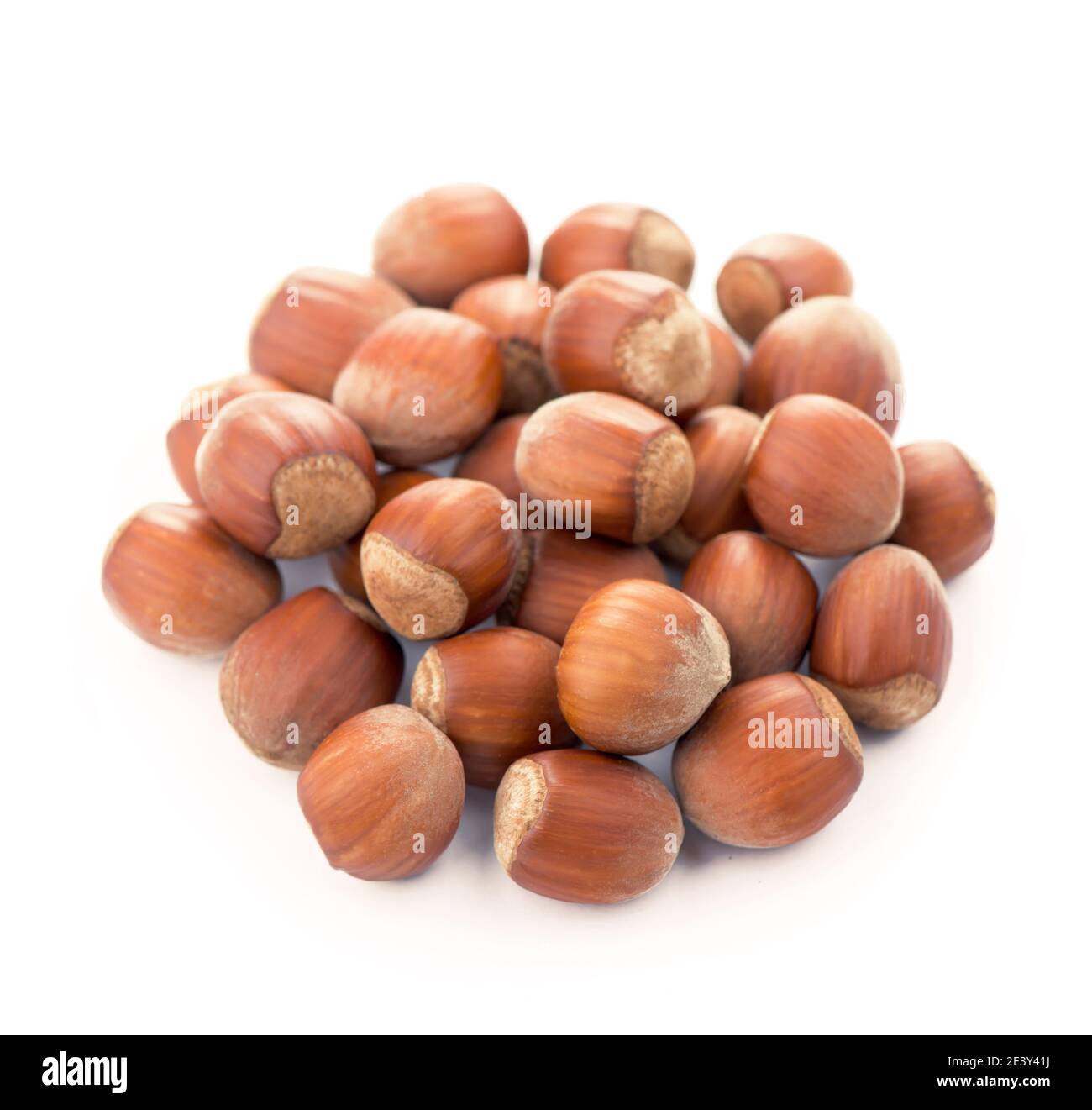 Closeup of hazelnuts, isolated on the white background, clipping path ...