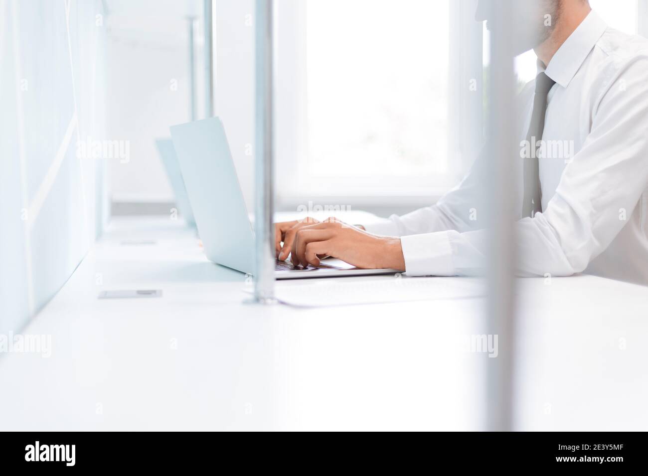 background image of a business man working on an office laptop Stock ...
