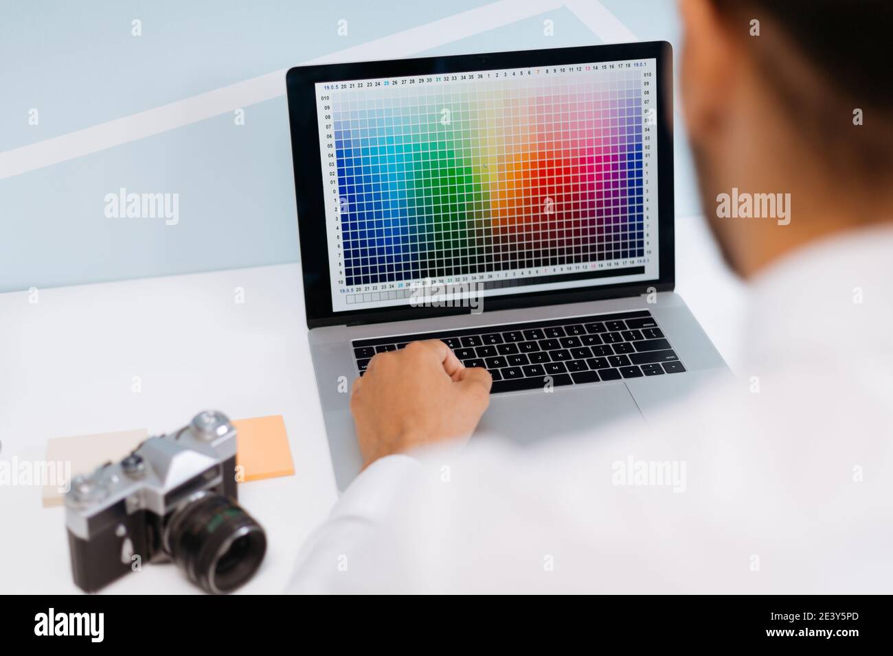 Retoucher photographer using laptop to edit photos Stock Photo - Alamy