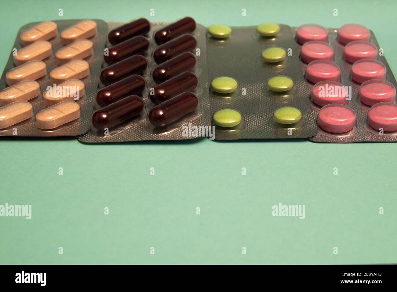 light green background health drugs, medicine Stock Photo - Alamy