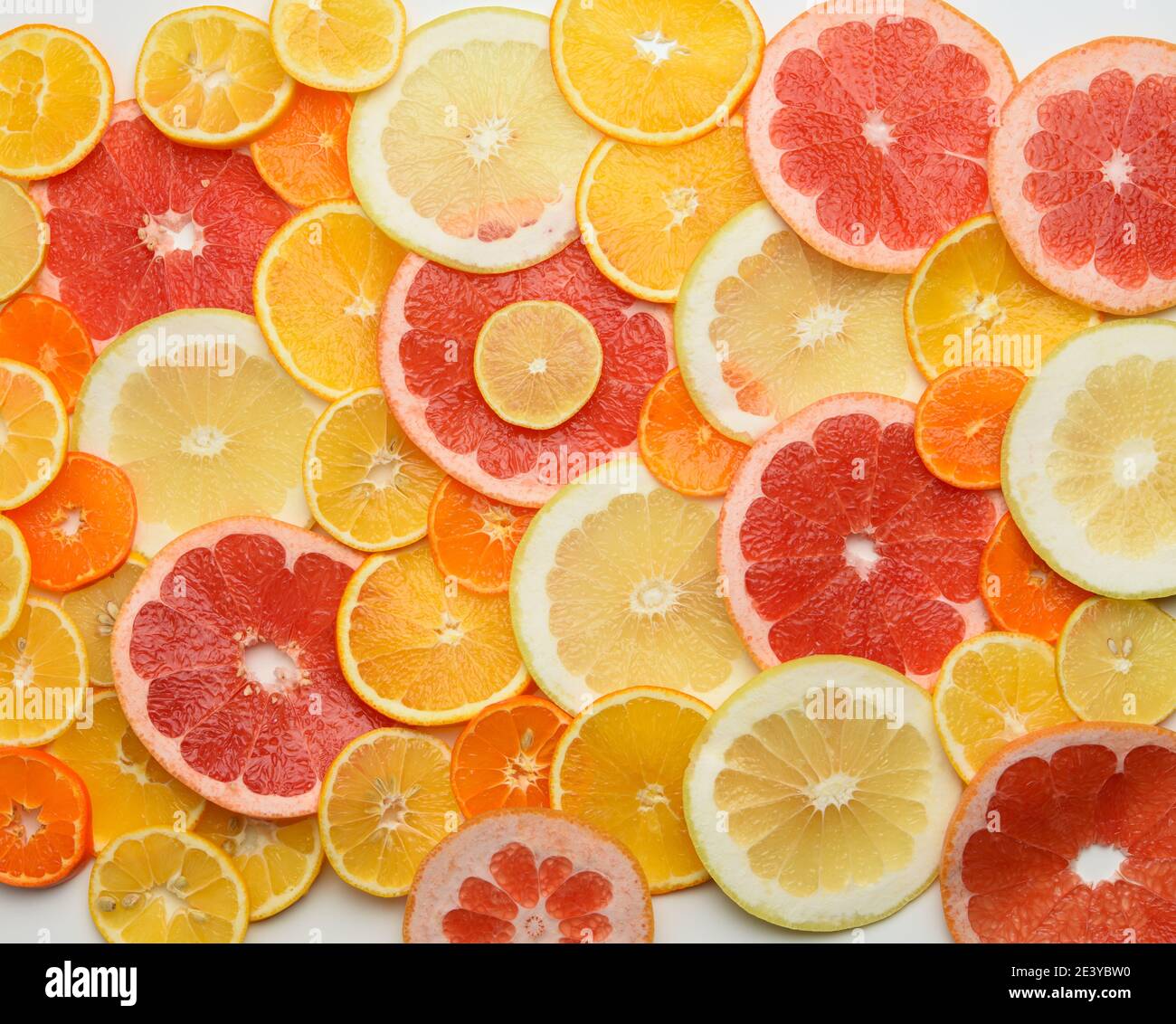 citrus fruits cut into round pieces: orange, grapefruit, lemon ...