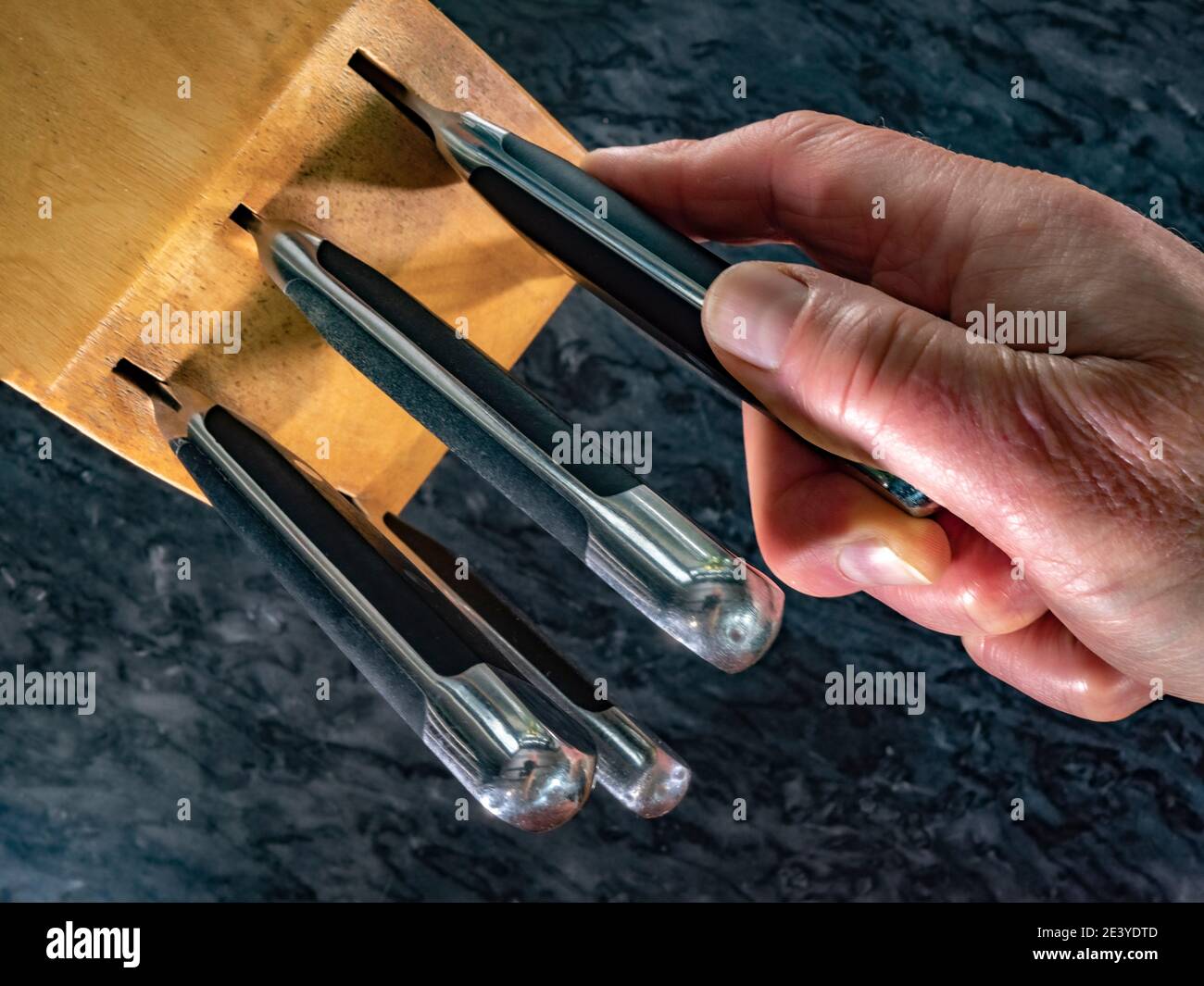 Knife block man hi-res stock photography and images - Alamy