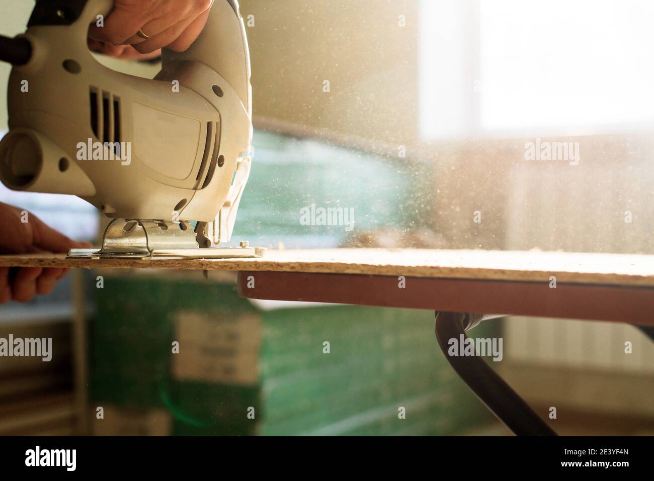 Sawing wooden plank jig saw hi-res stock photography and images - Alamy