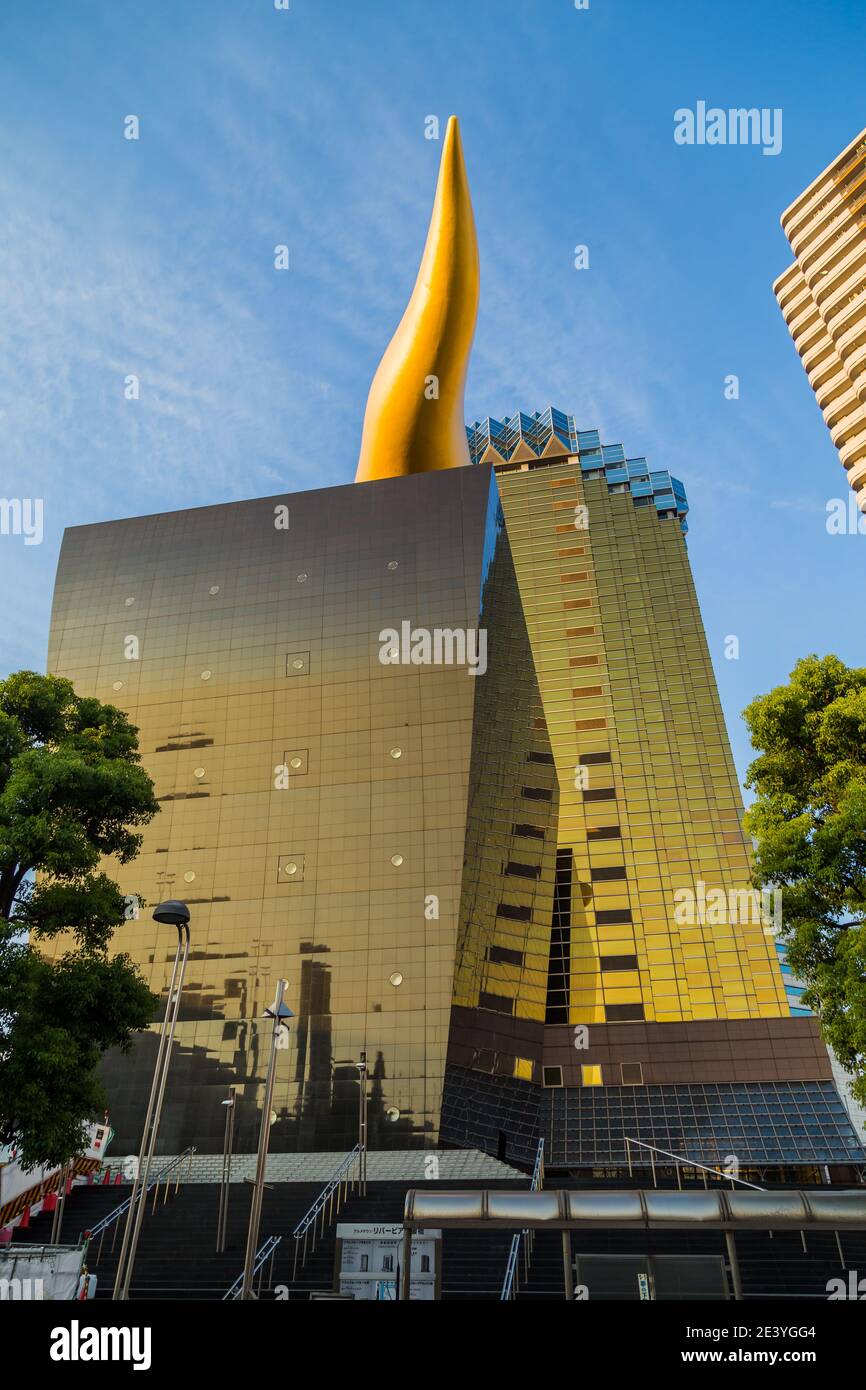 Tokyo. Japan: Asahi Beer buildings. Sunny day. Blue sky. Asahi ...