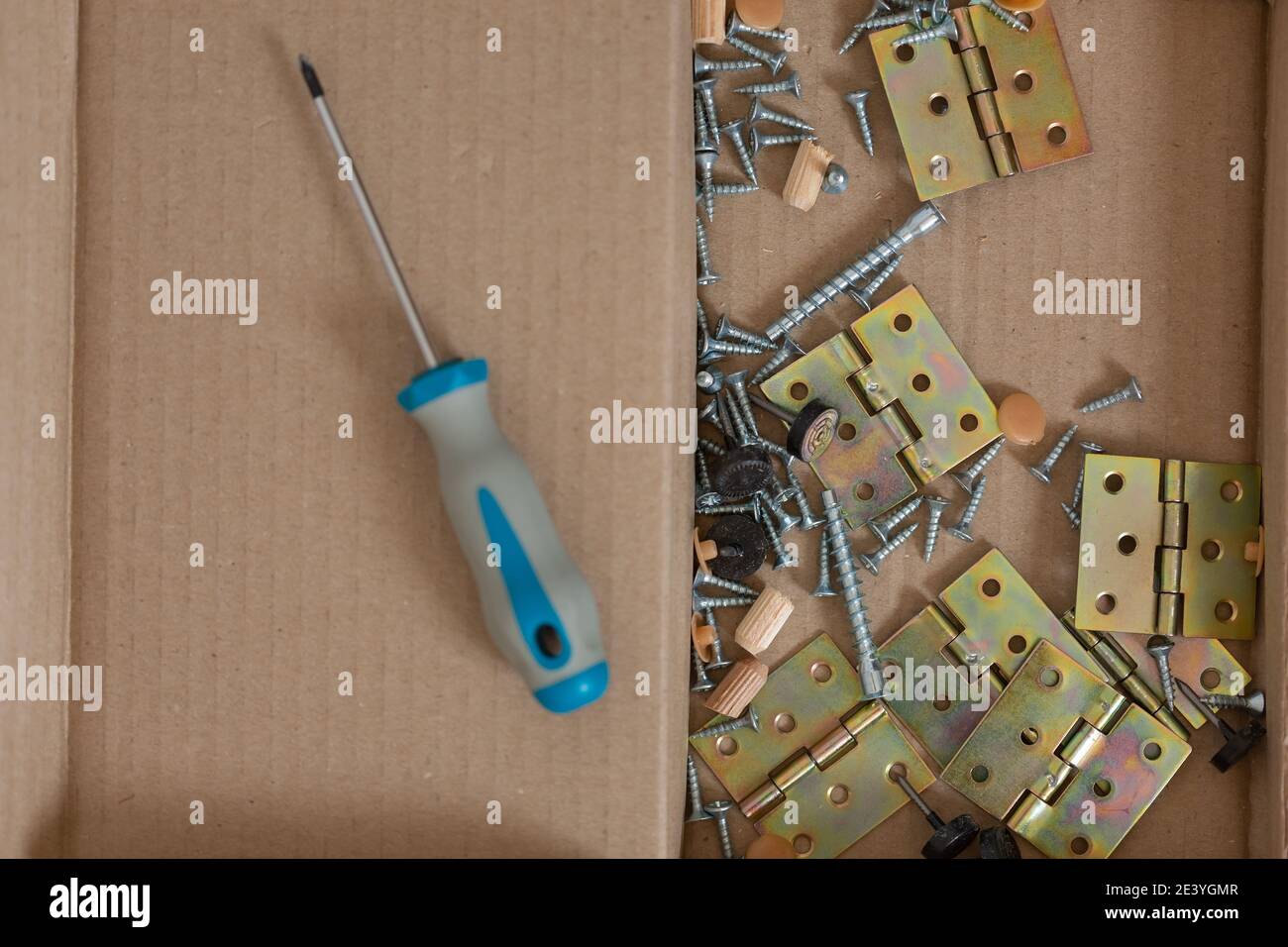Wood screws and fasteners for wood furniture Stock Photo - Alamy