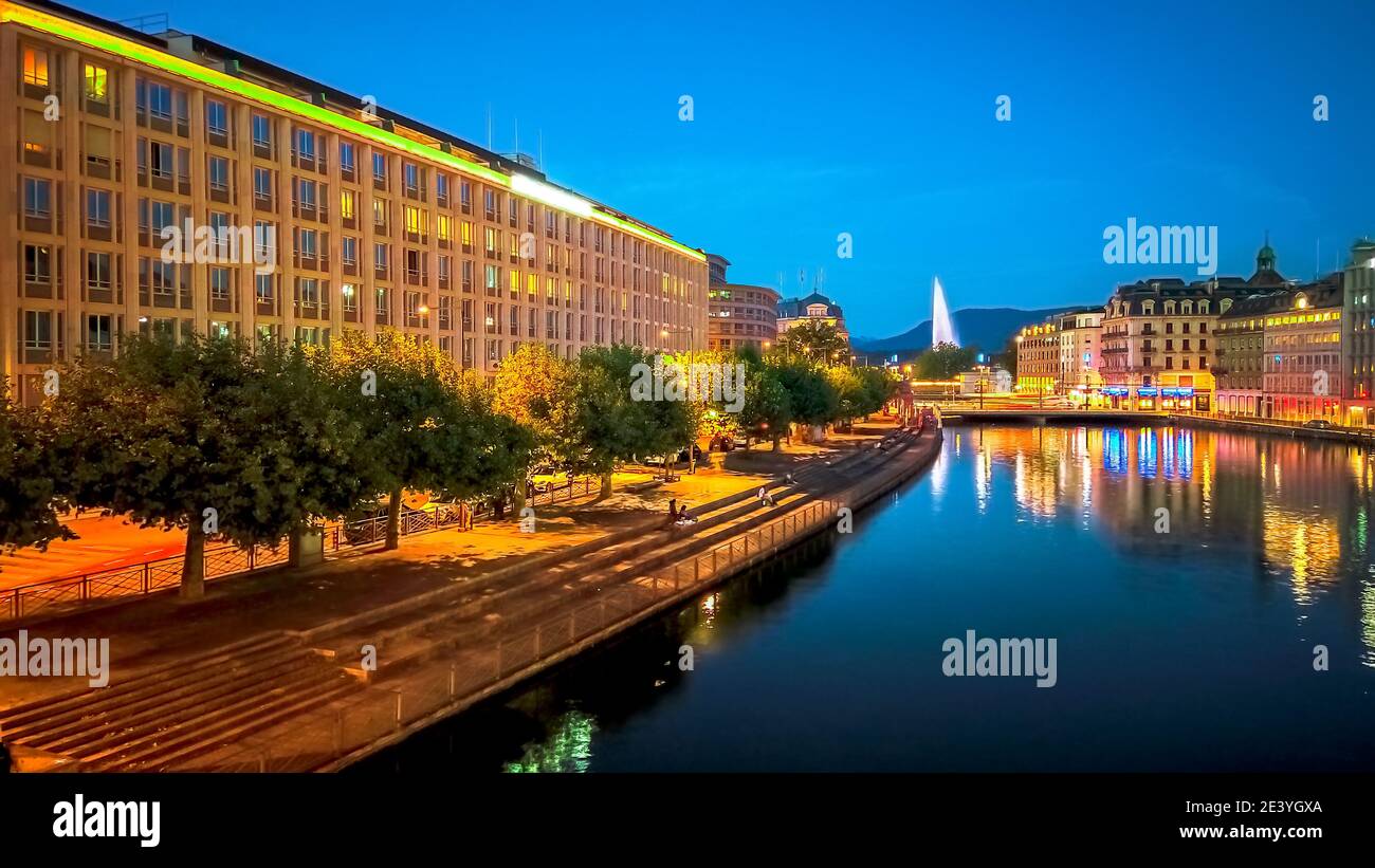 Amazing view of Geneva in Switzerland by evening. Jet d'eau fountain ...