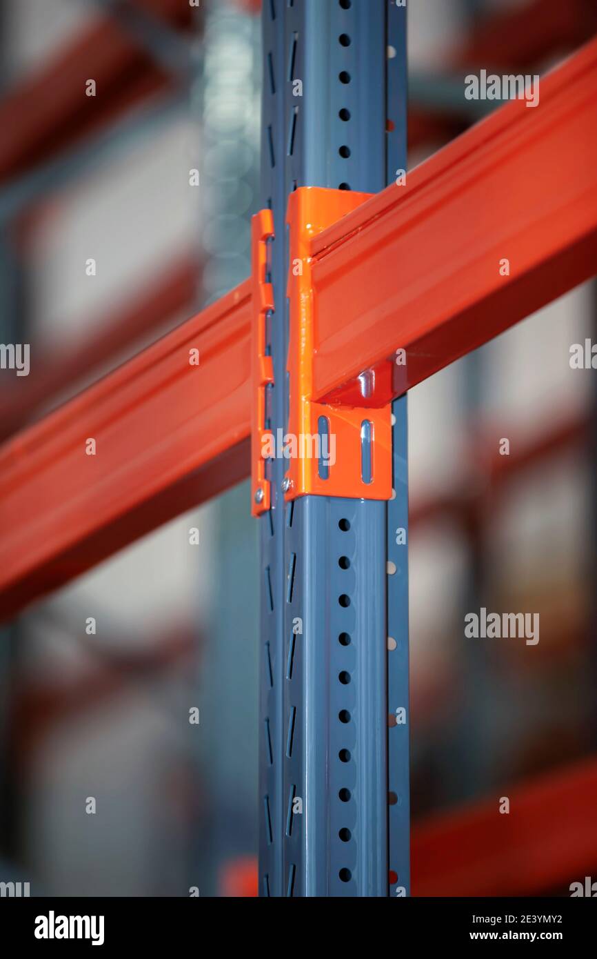 Metal joints of warehouse shelves Stock Photo - Alamy