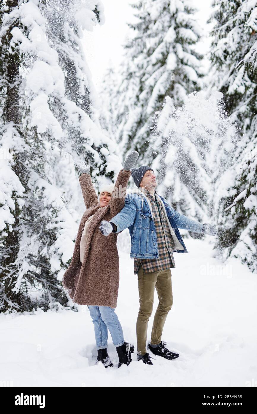 Portrait happy young couple throwing hi-res stock photography and ...