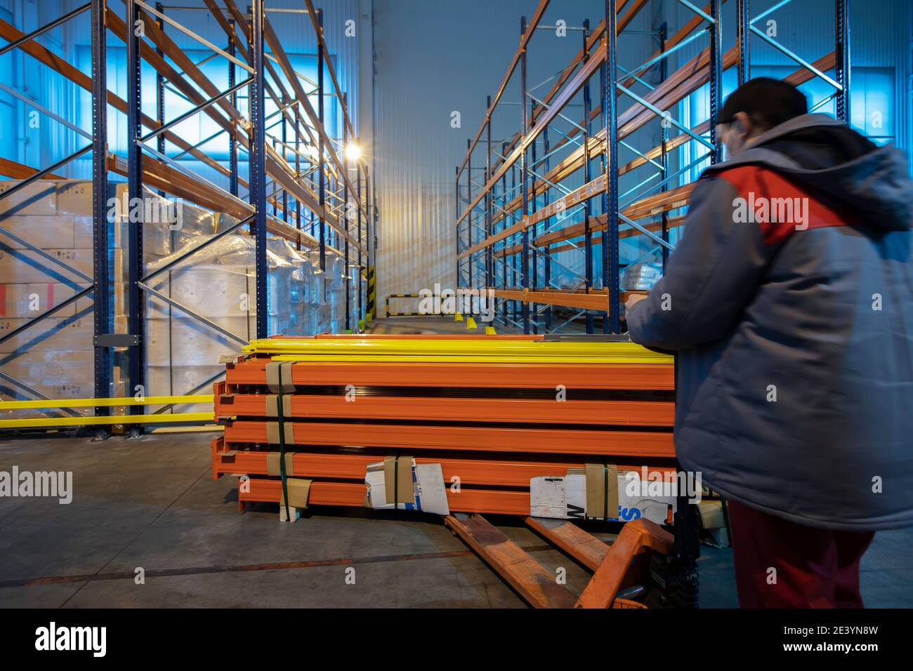 Warehouse premises of a factory or workshop with metal shelves Stock ...