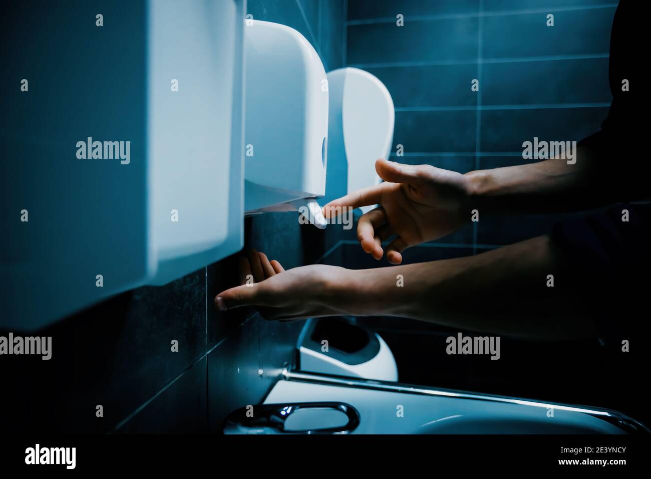 close up. young man using a bactericidal hand wash Stock Photo - Alamy