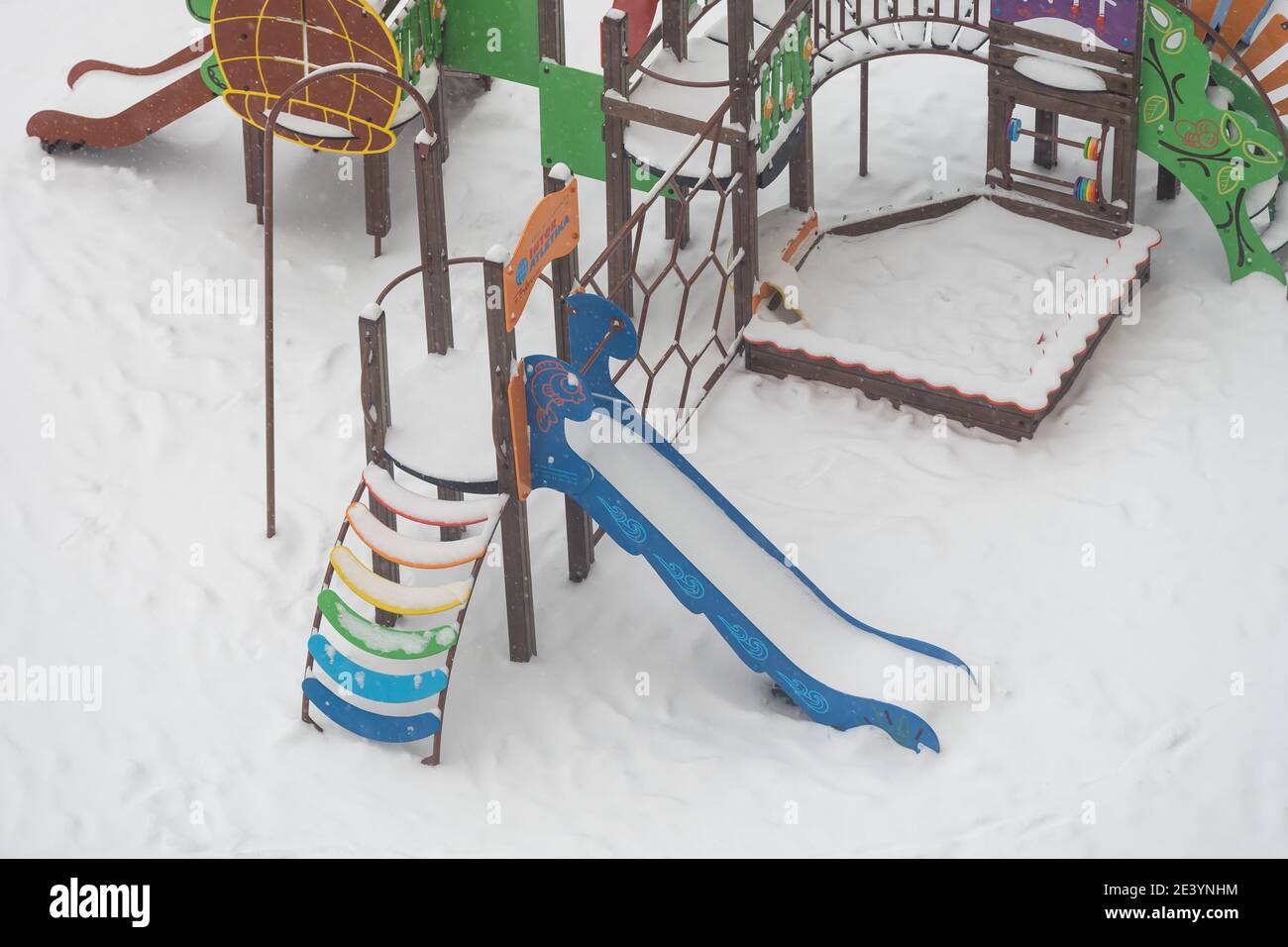 Playground in winter with snow Stock Photo - Alamy