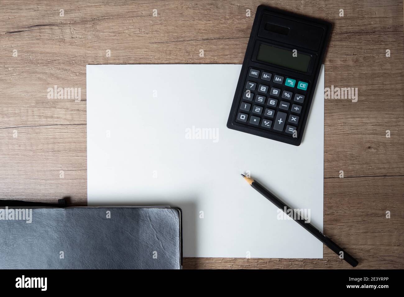 Personal leather bounded journal. Black pencil on empty paper blank ...