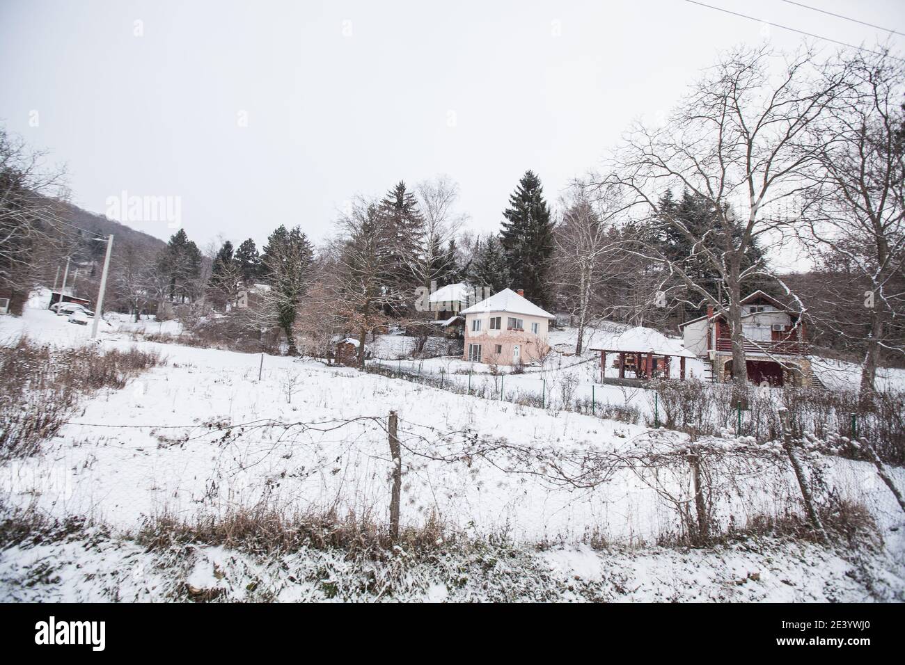 Rural winter landscape of snowy day, village in the Serbia Stock Photo ...