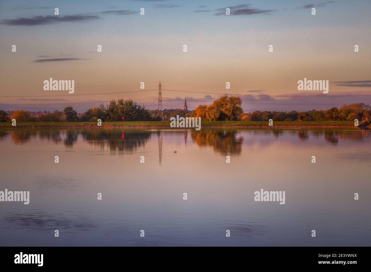 Beautiful sunrise light and reflections on Shustoke Reservoir in ...
