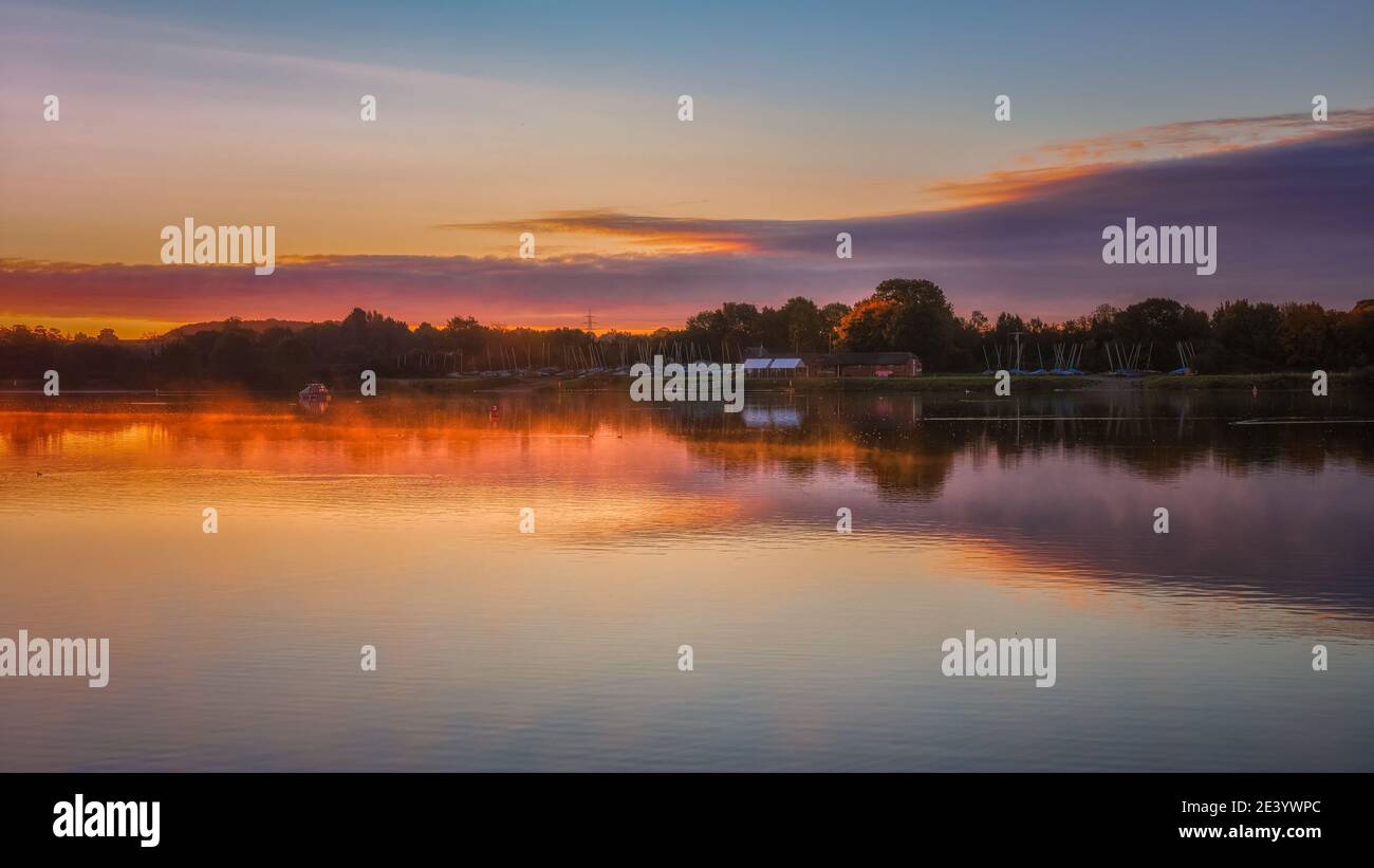 Beautiful sunrise light and reflections on Shustoke Reservoir in ...