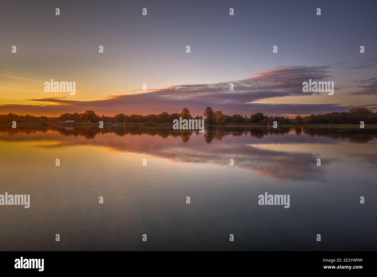 Beautiful sunrise light and reflections on Shustoke Reservoir in ...