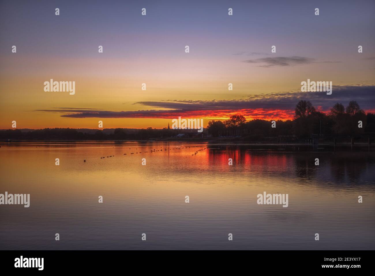 Beautiful sunrise light and reflections on Shustoke Reservoir in ...