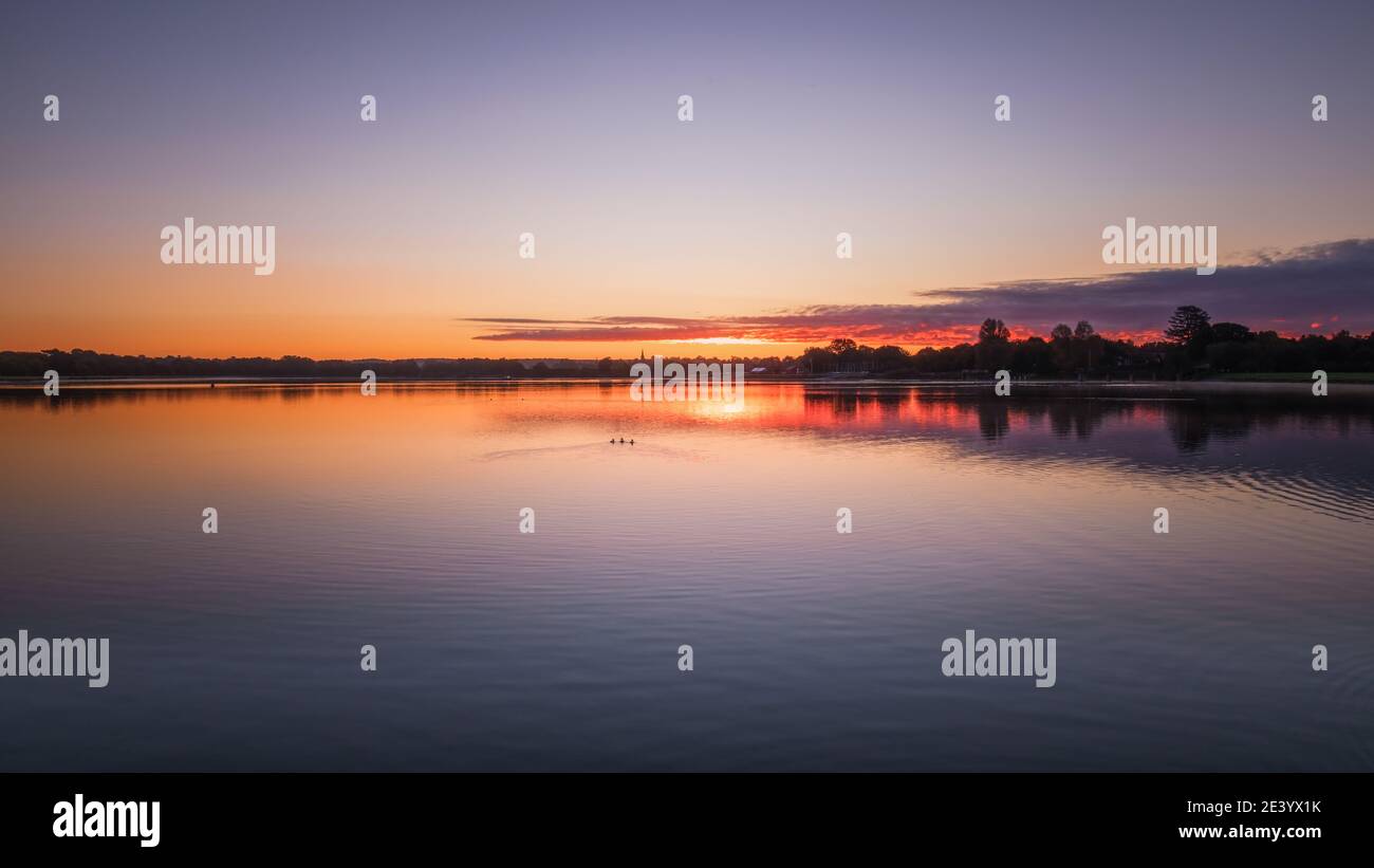Beautiful sunrise light and reflections on Shustoke Reservoir in ...
