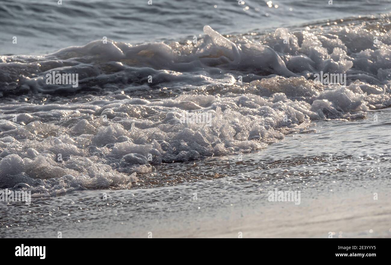 wave splash sea beach macro, close up Stock Photo - Alamy