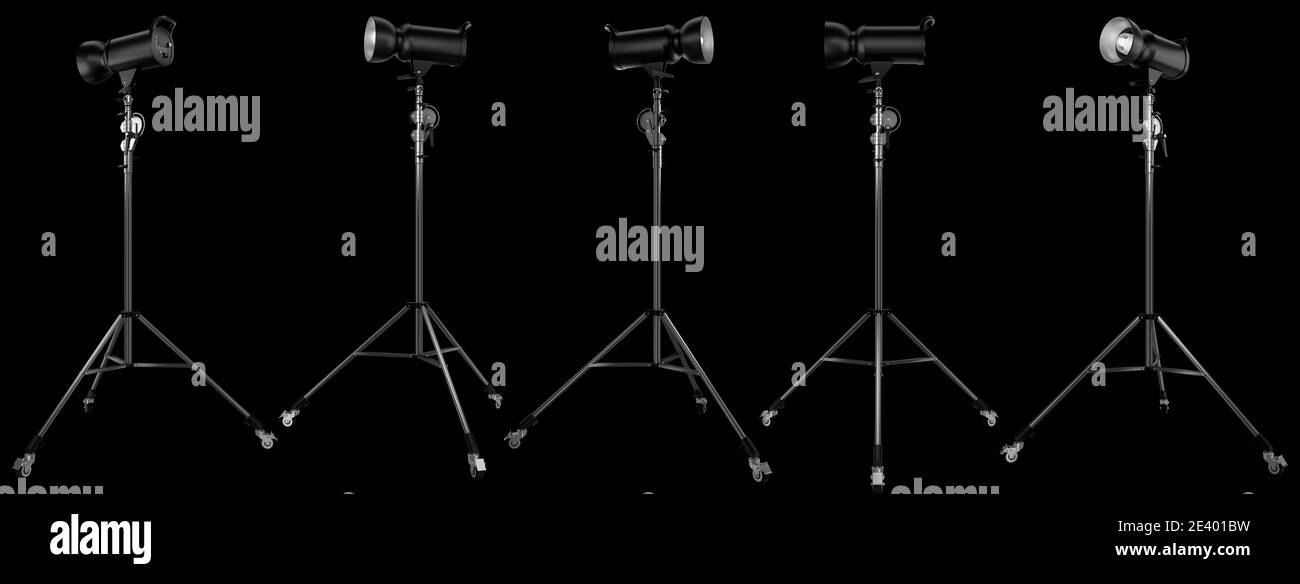 Photography studio flash on a tripod or stand isolated on black ...