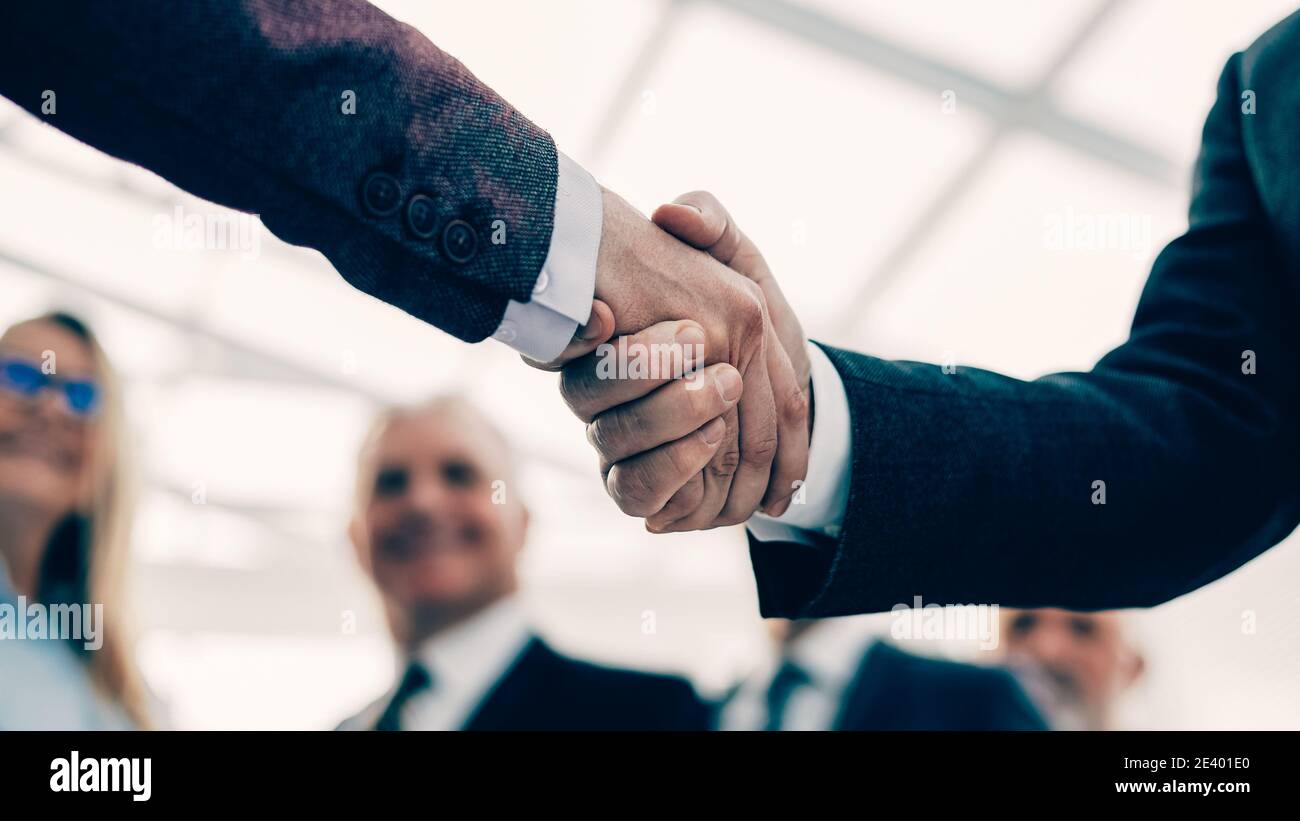 close up. business people greeting each other with a handshake Stock ... close up. business people greeting each other with a handshake Stock ...