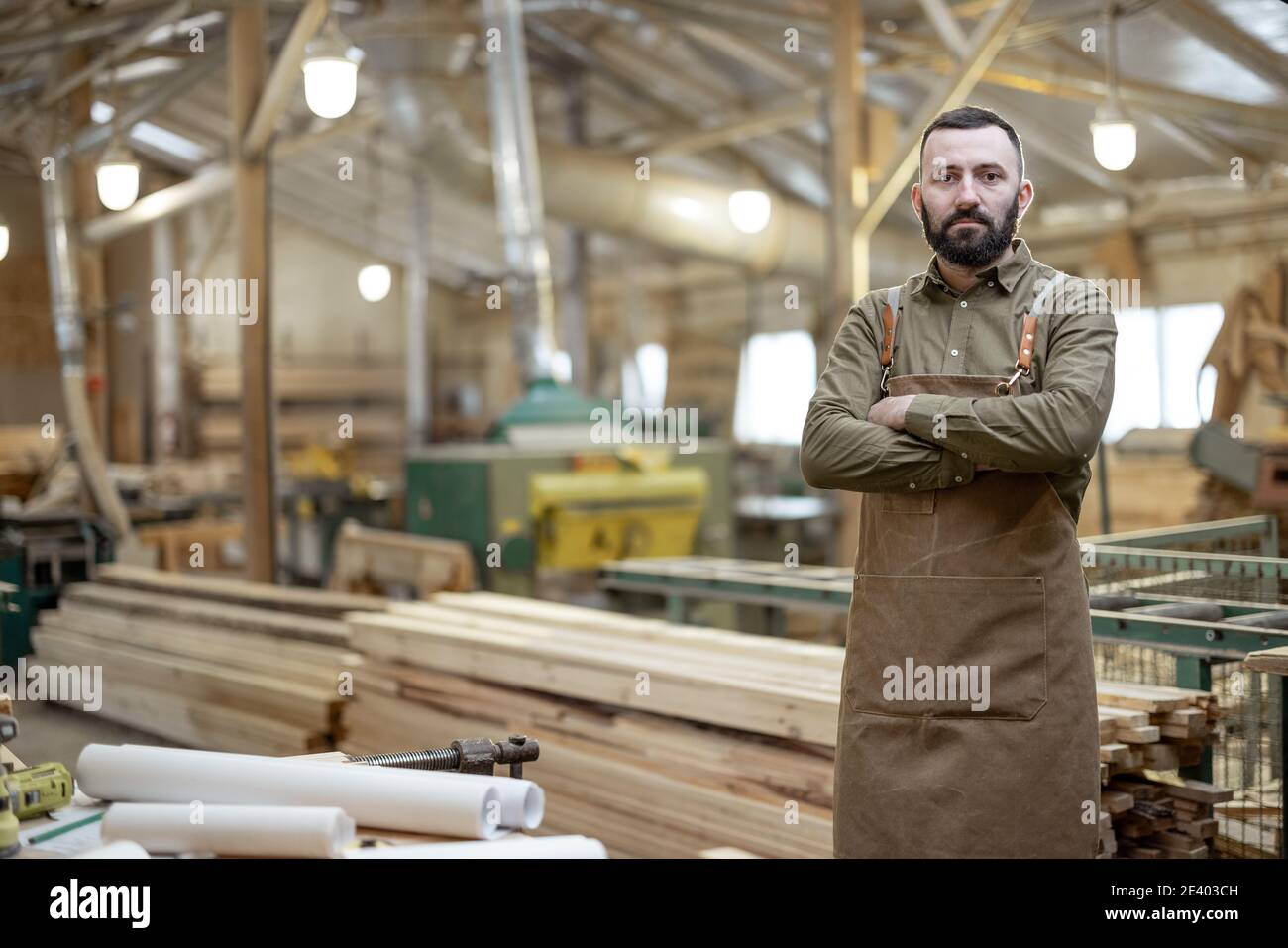 Handsome carpentry worker in the joinery manufacturing Stock Photo - Alamy