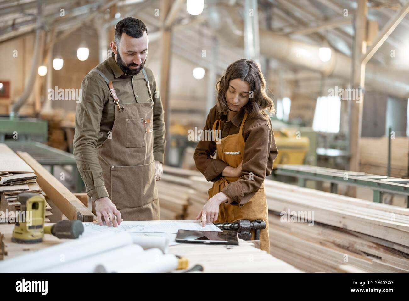 Two carpentry workers at the manufacturing Stock Photo - Alamy