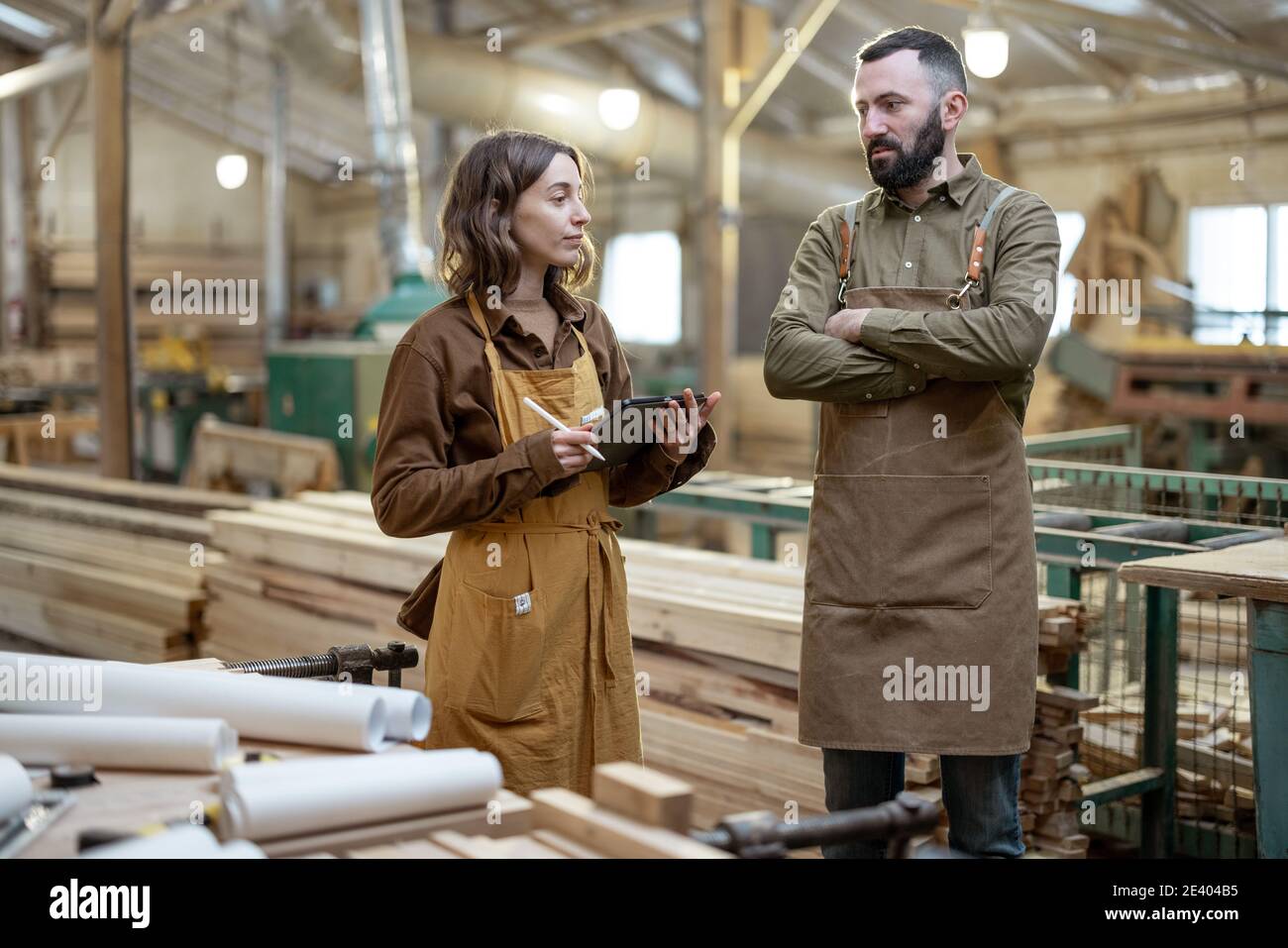 Two carpentry workers at the manufacturing Stock Photo - Alamy