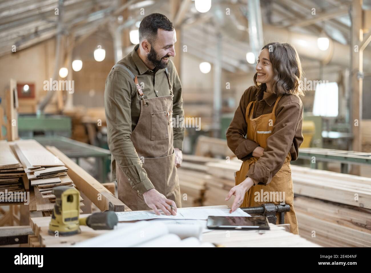 Two carpentry workers at the manufacturing Stock Photo - Alamy