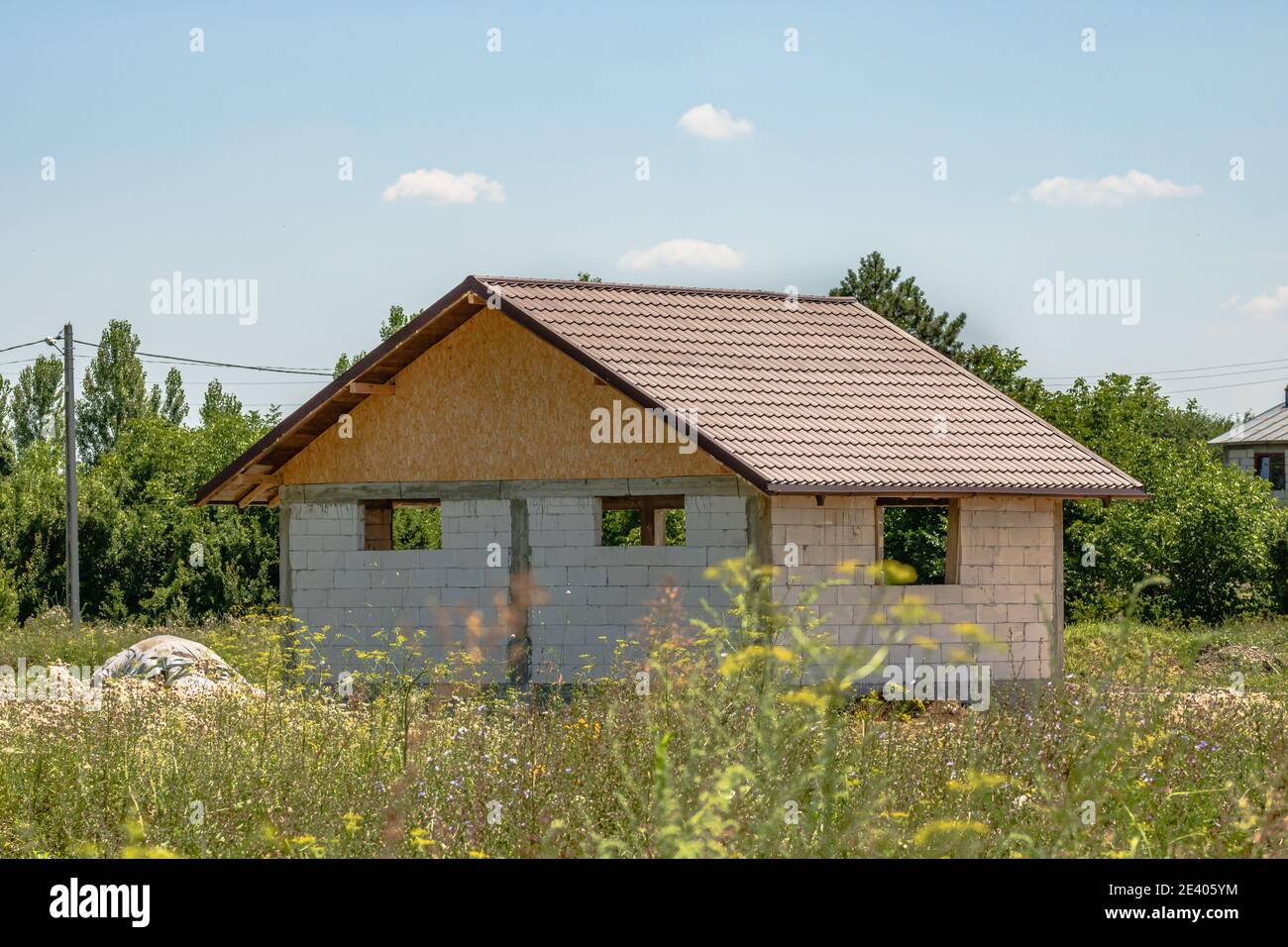 New construction, unfinished small house in a rural area Stock Photo ...
