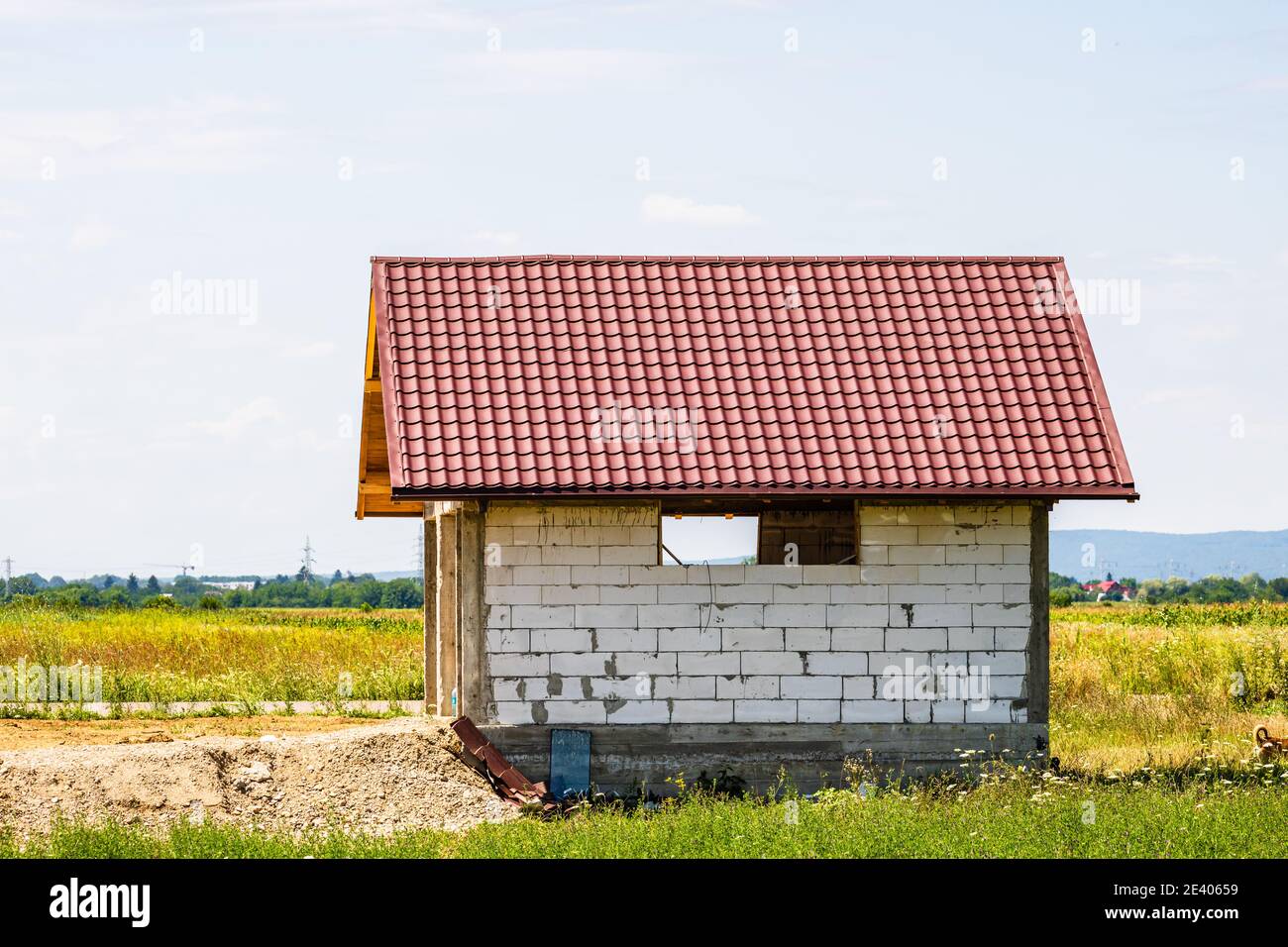New construction, unfinished small house in a rural area Stock Photo ...