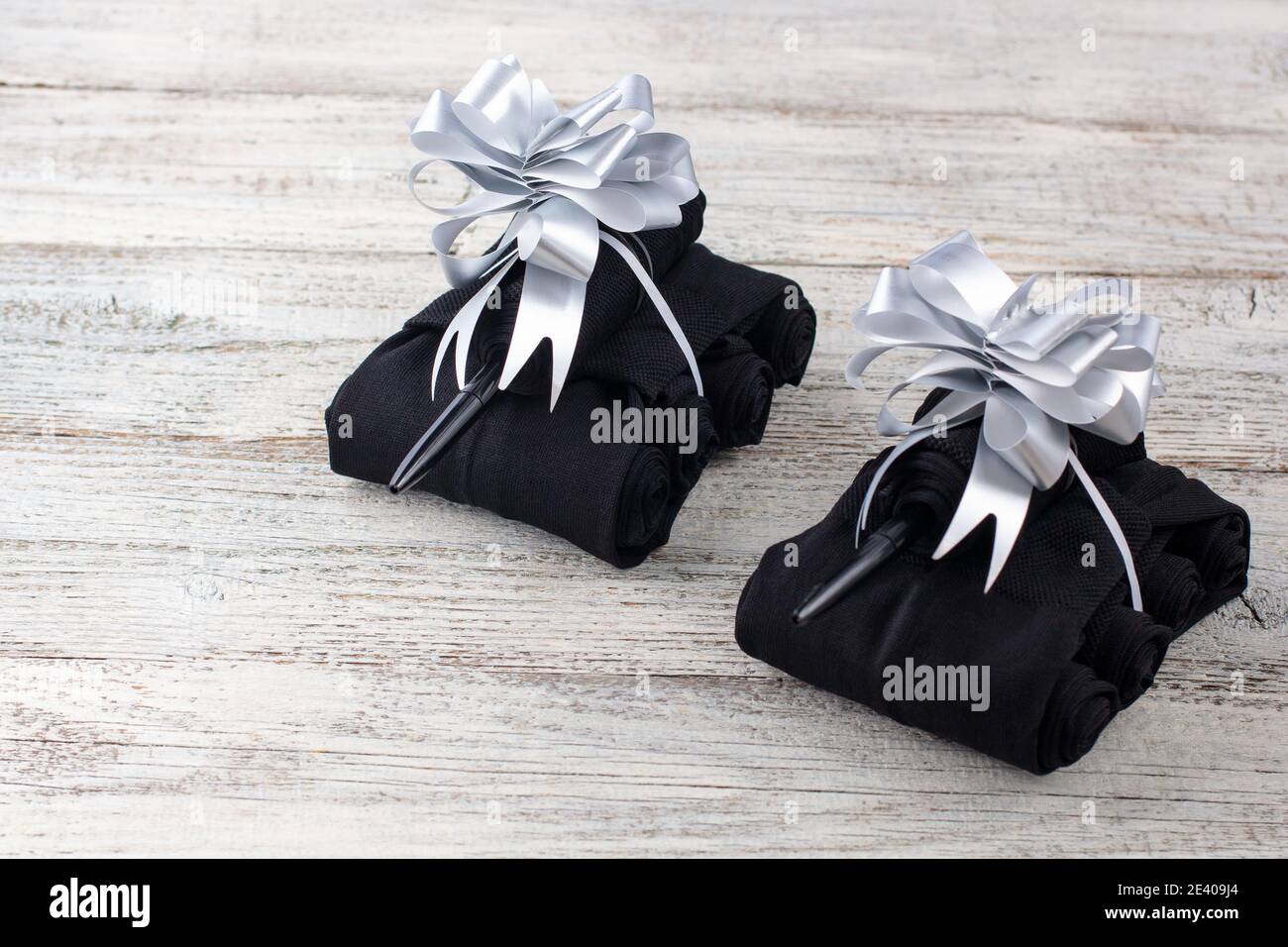 Handmade tanks of socks as gift to men on February 23 on white ...