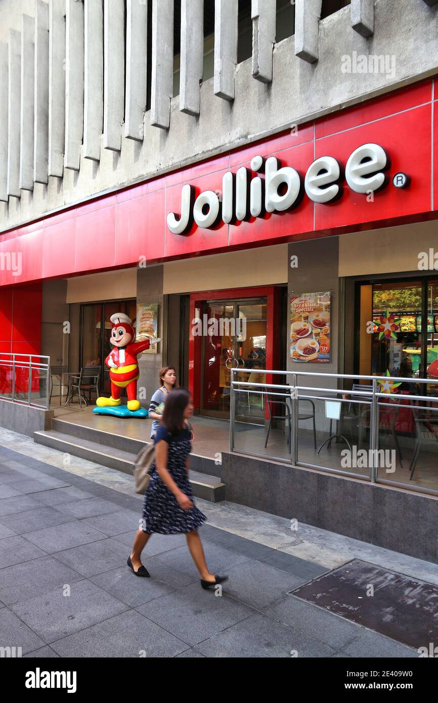 MANILA, PHILIPPINES - NOVEMBER 28, 2017: People visit Jollibee fast ...